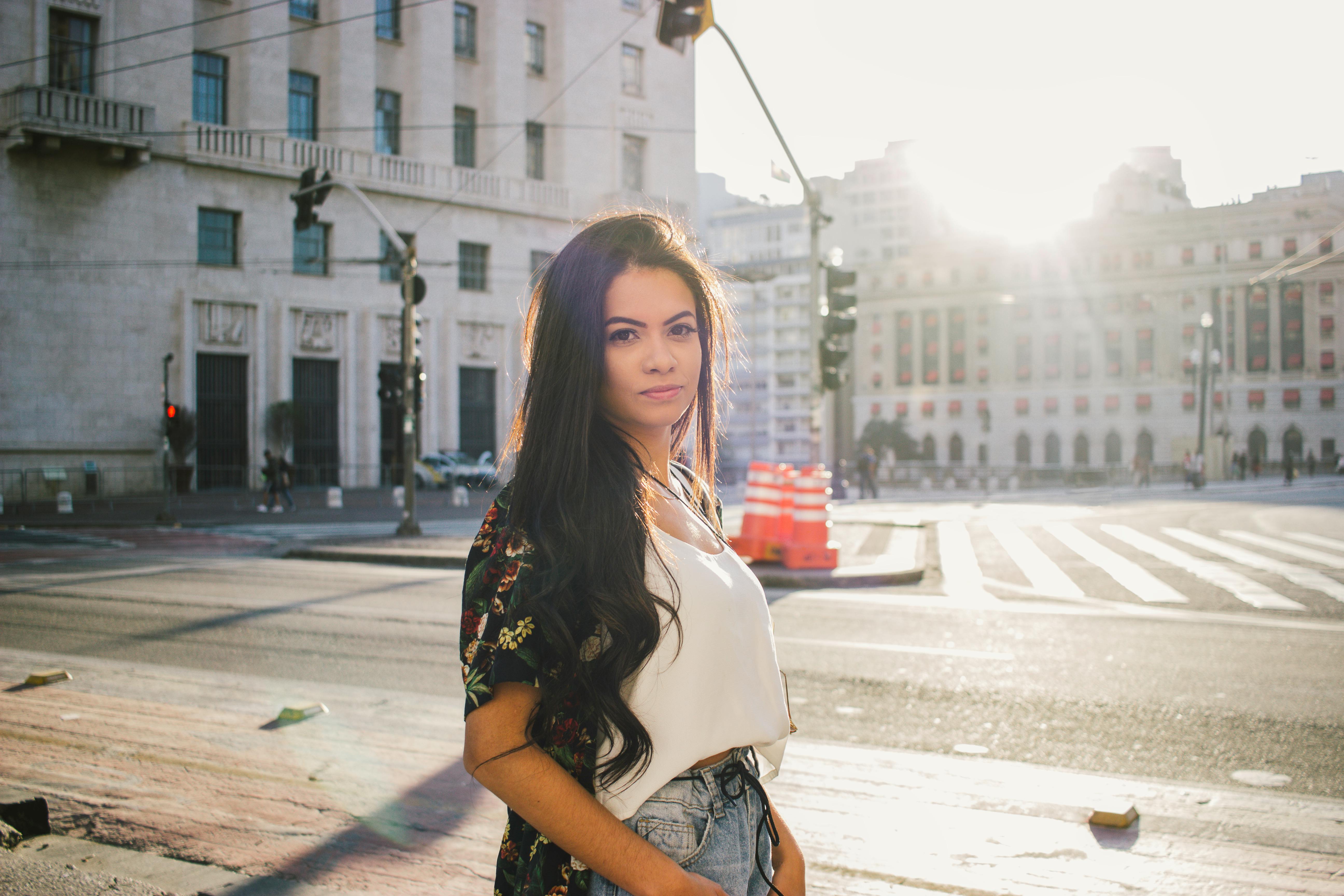 Woman Standing over the Ripped Sack with Grain · Free Stock Photo