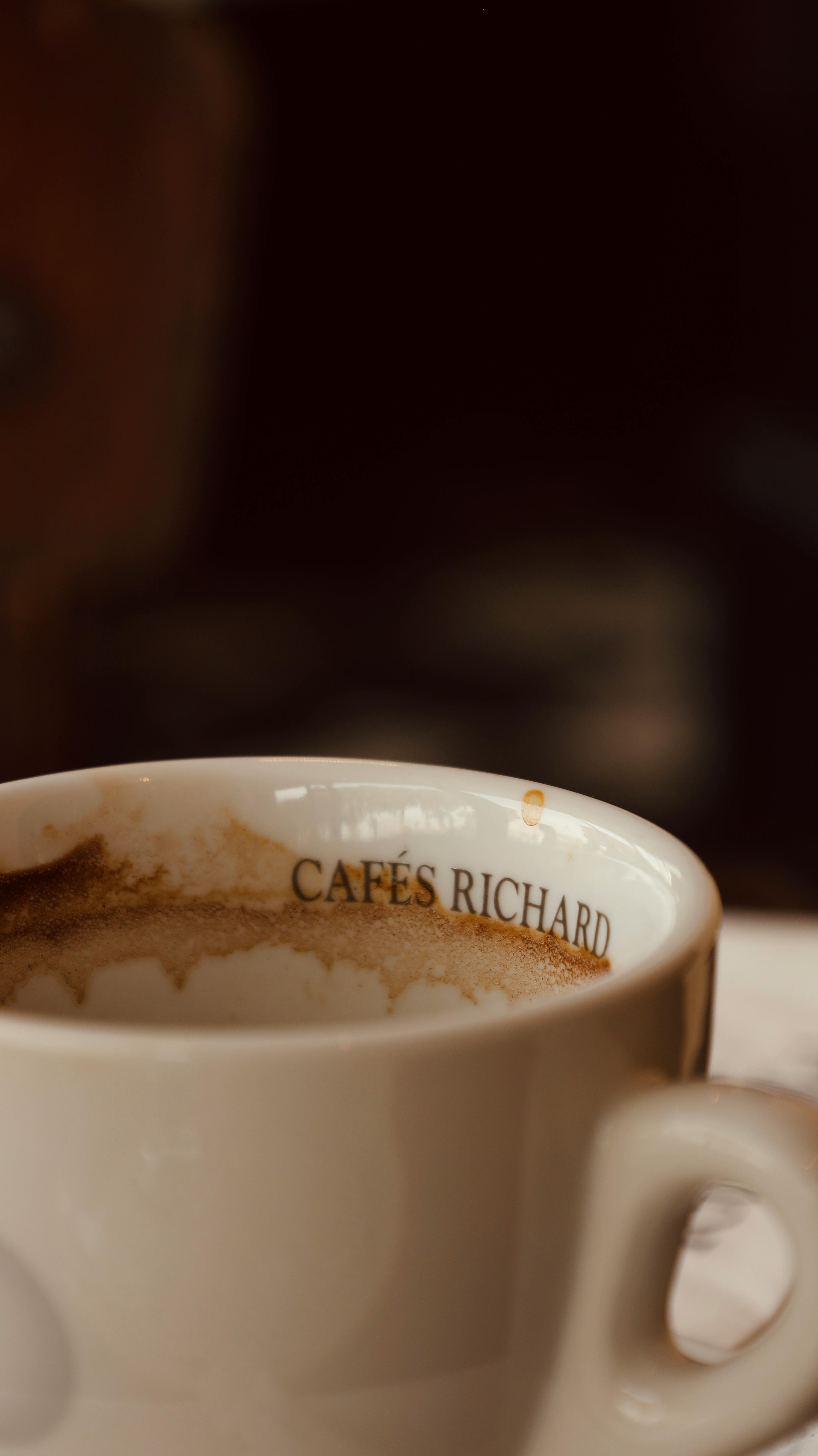 Close-up of Cafés Richard Coffee Cup with Foam · Free Stock Photo