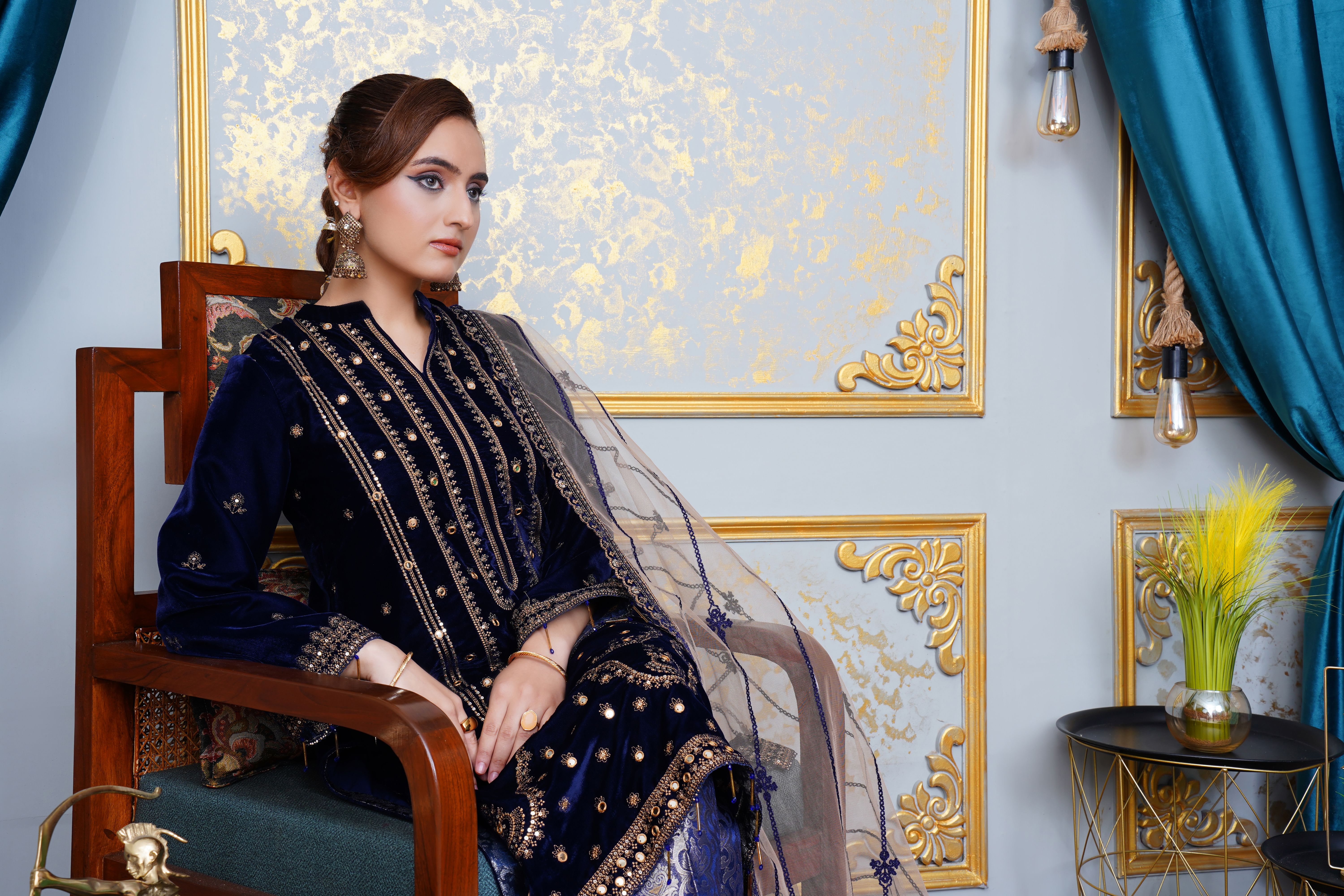 Elegant Woman in Traditional Blue Attire · Free Stock Photo