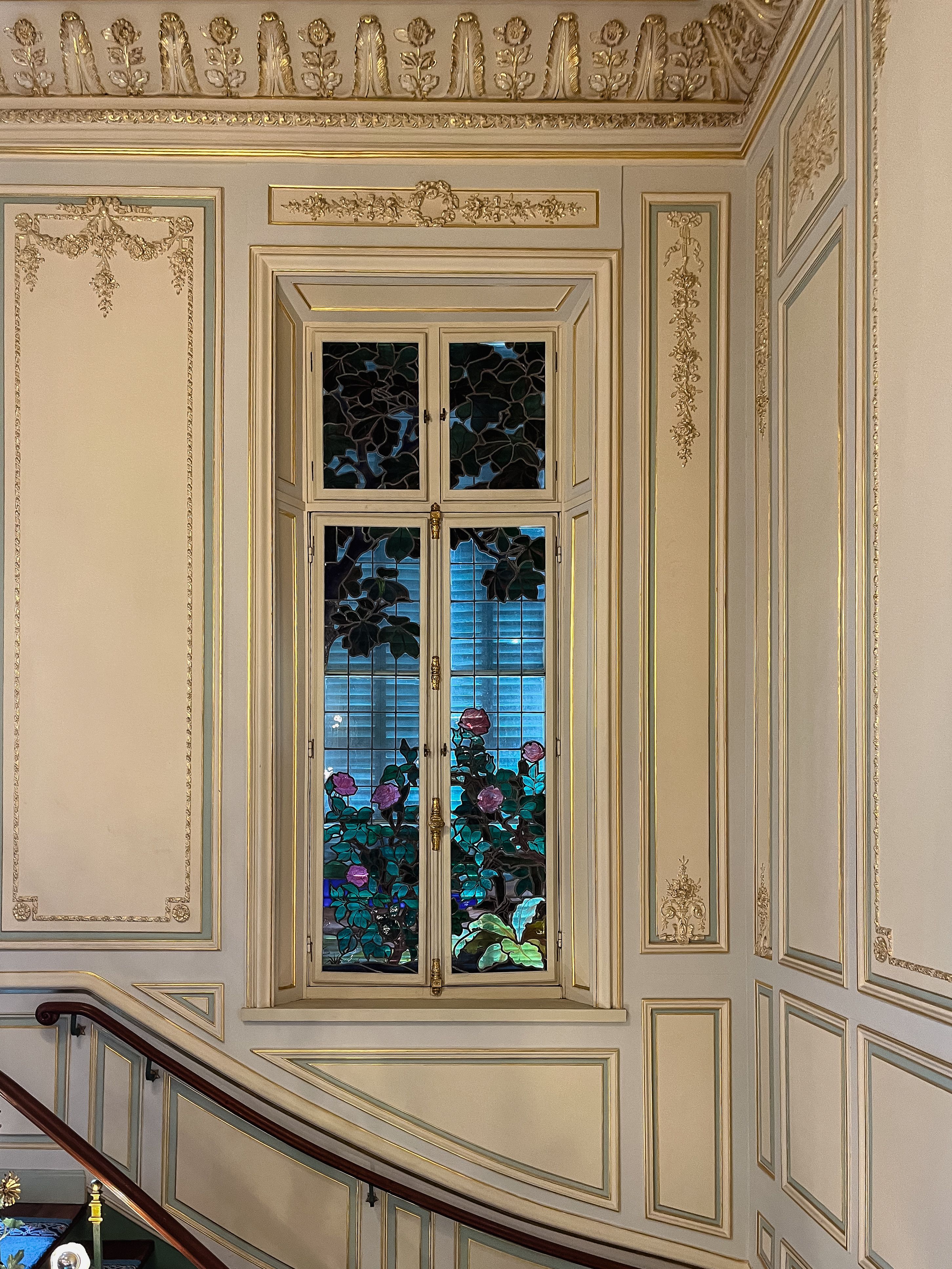 Elegant Ornate Staircase with Stained Glass Window · Free Stock Photo