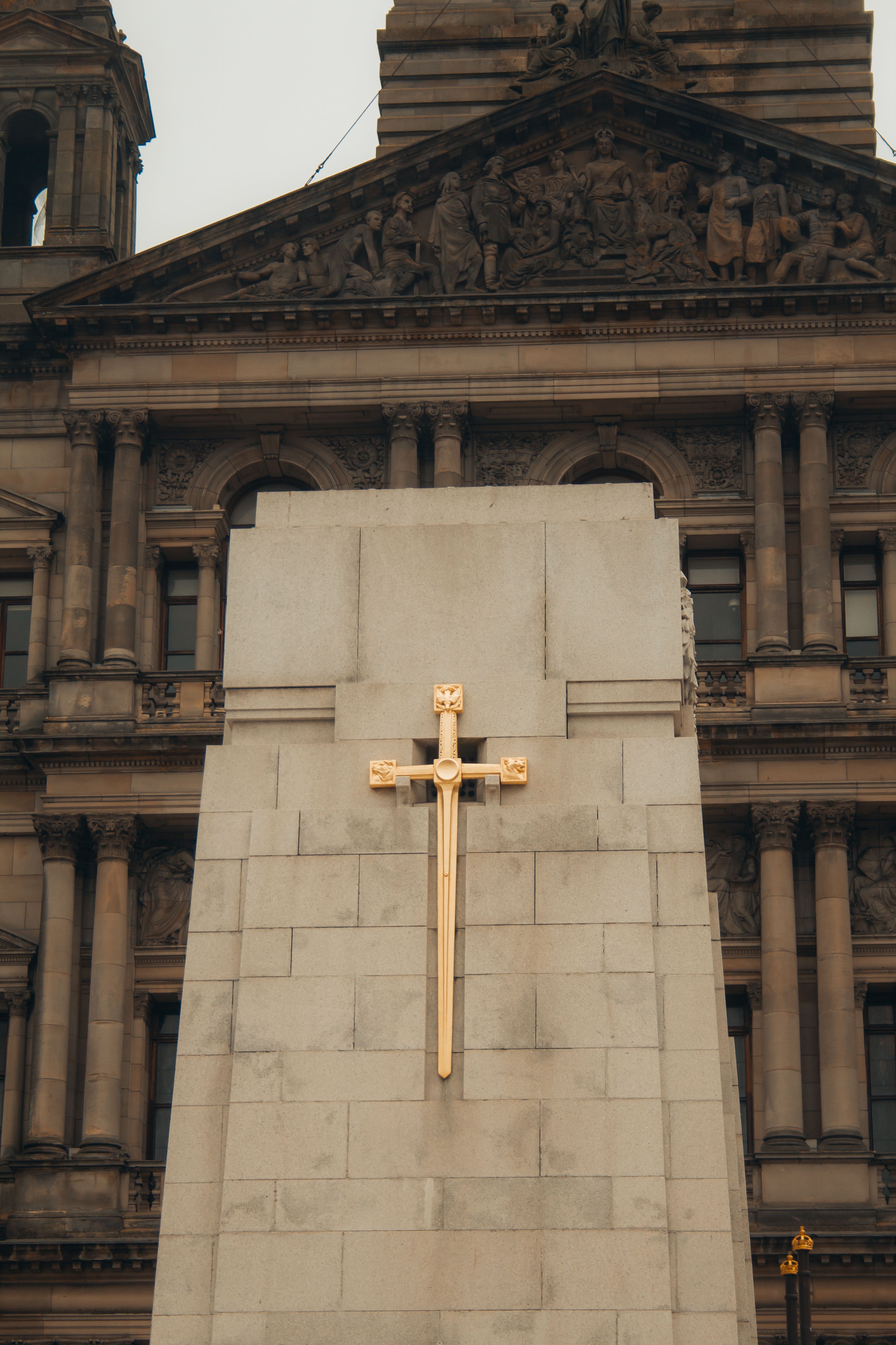 Golden Cross on Stone Monument with Historic Architecture · Free Stock ...