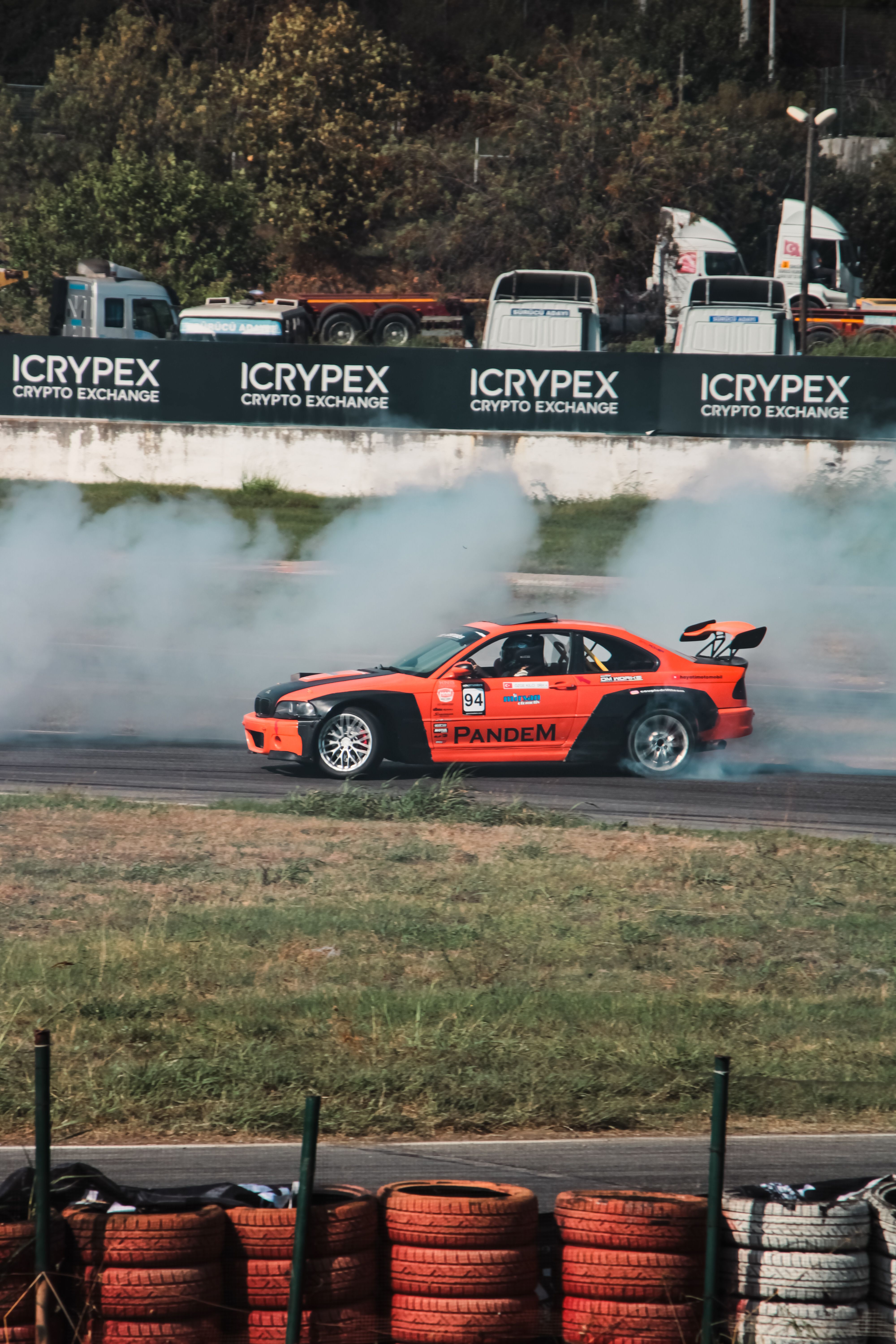 Exciting Drift Racing on Outdoor Circuit Track · Free Stock Photo
