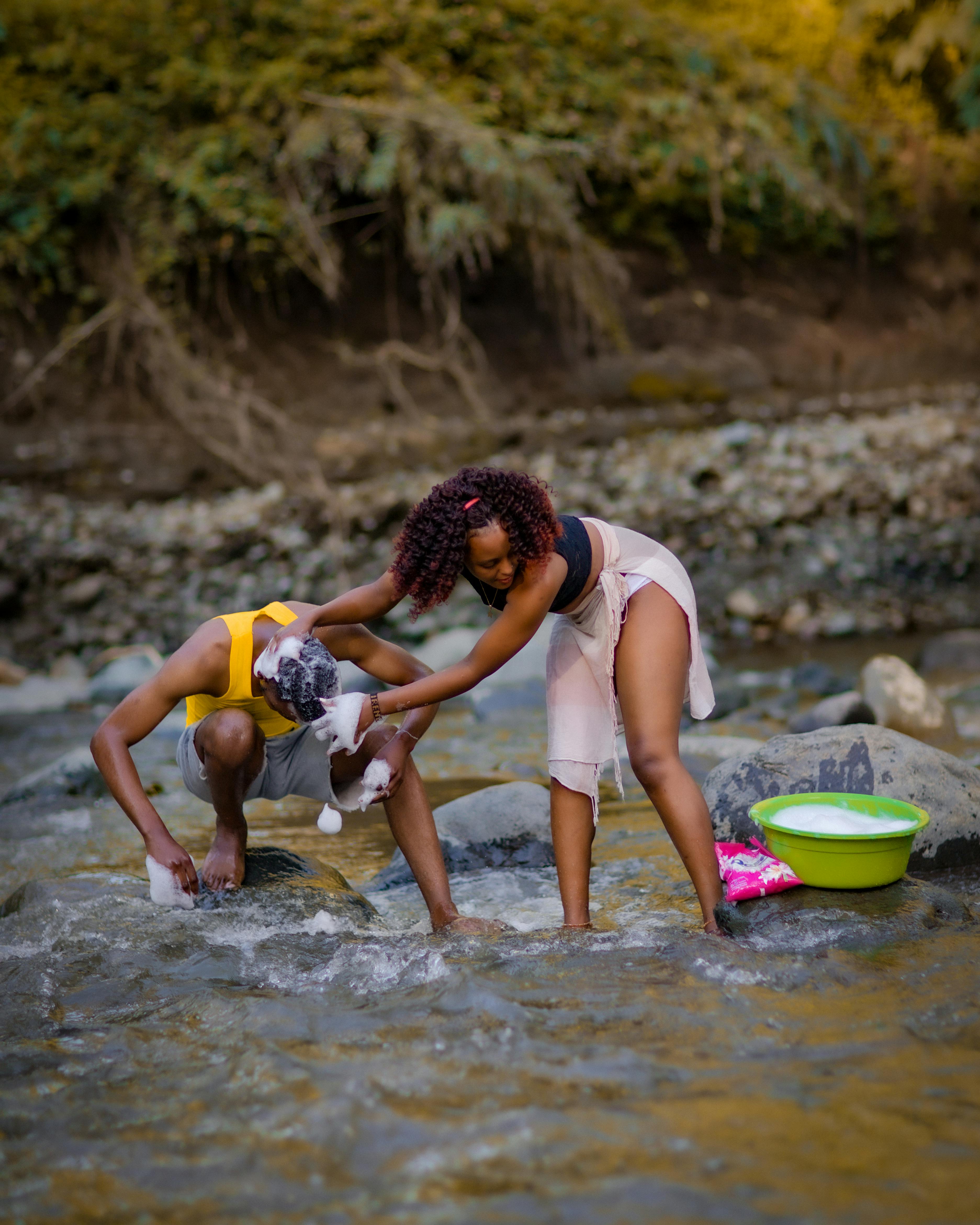 African Lady Washing Clothes By Hands Photos, Download The BEST Free ...
