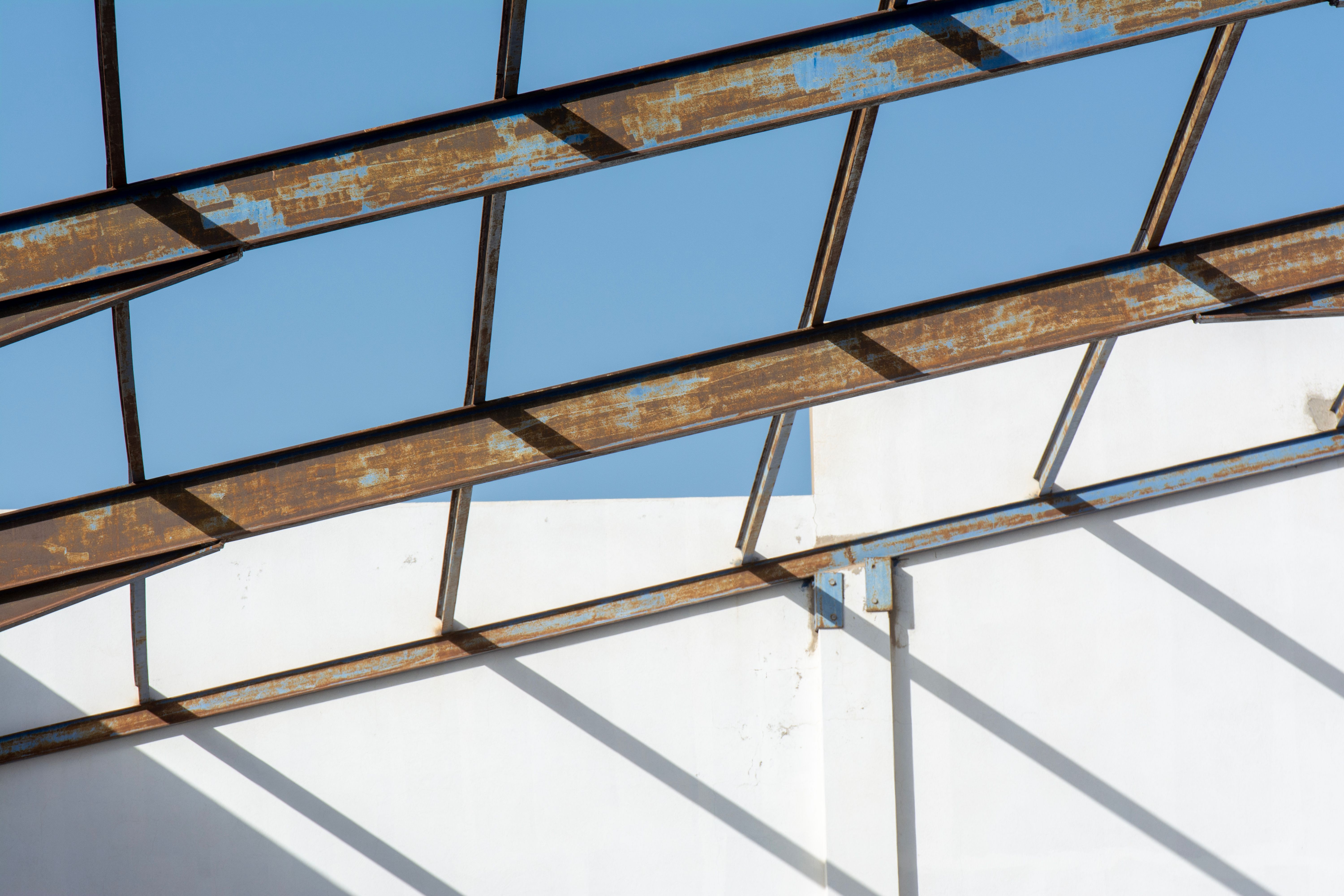 Industrial Metal Beams Against Clear Sky · Free Stock Photo