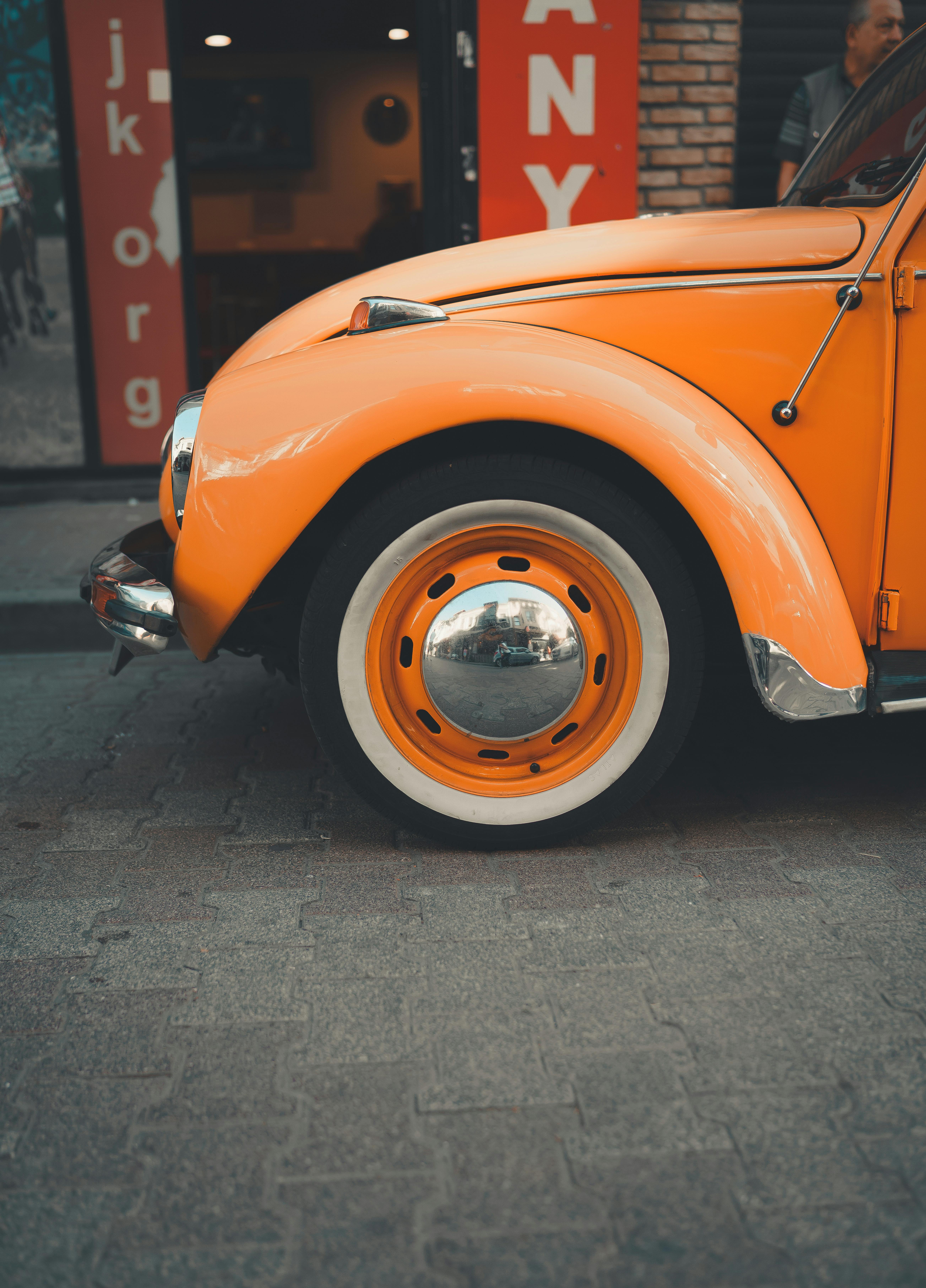 Vintage Orange Car in İstanbul Street Scene · Free Stock Photo