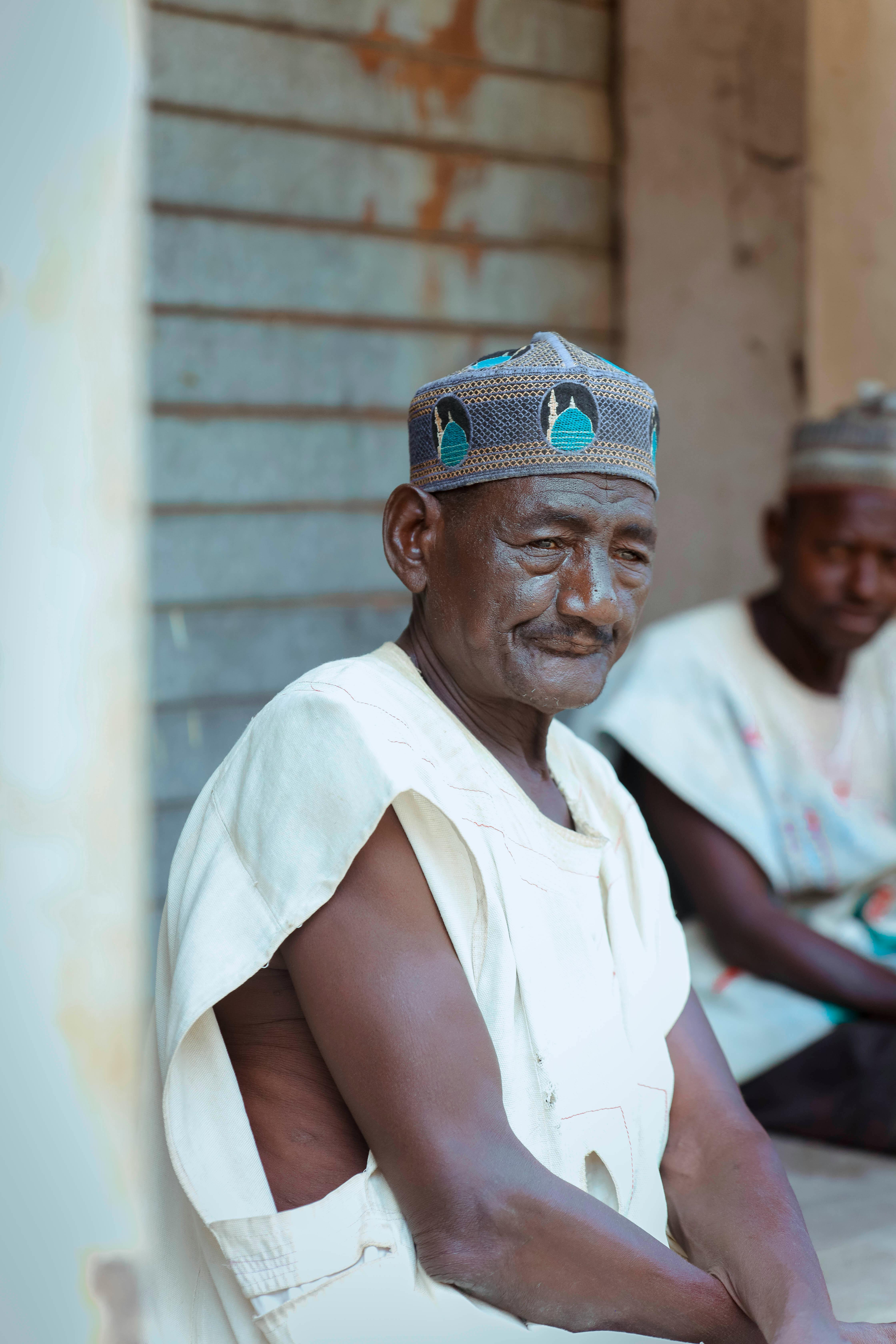 Portrait of Two African Men in Traditional Attire · Free Stock Photo