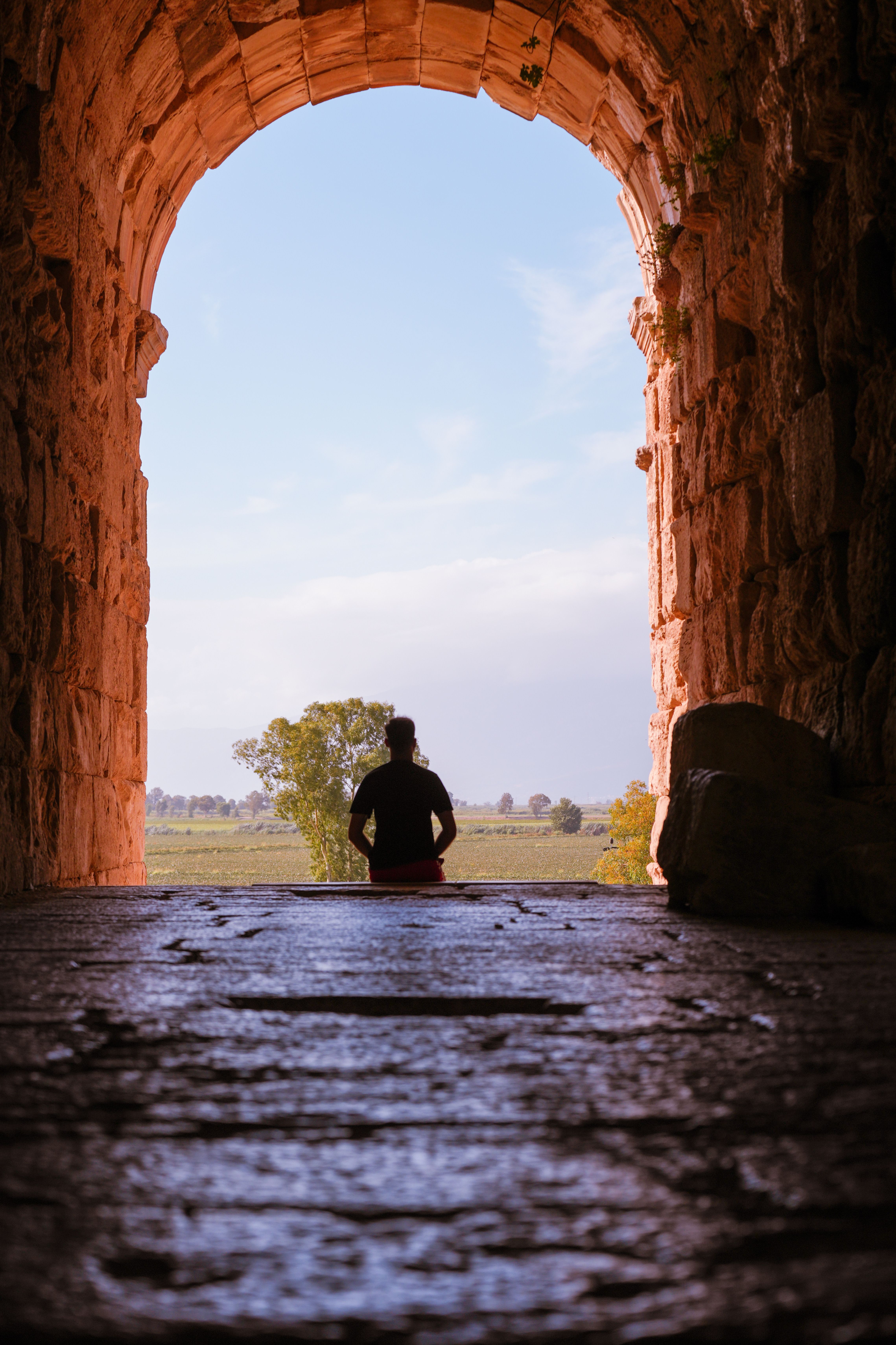 Man Standing Inside A Temple · Free Stock Photo