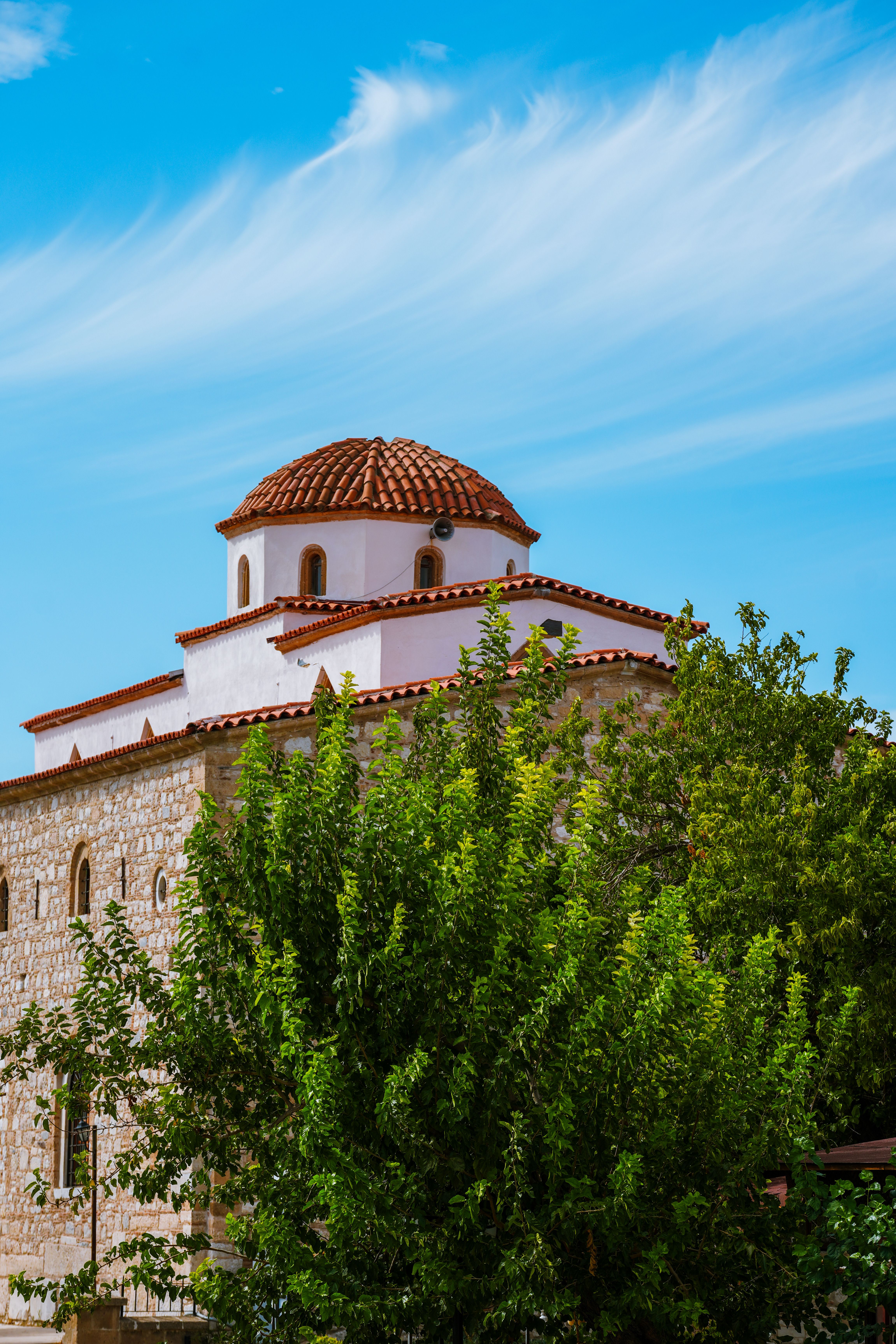 Historic Stone Building with Dome in Greenery · Free Stock Photo