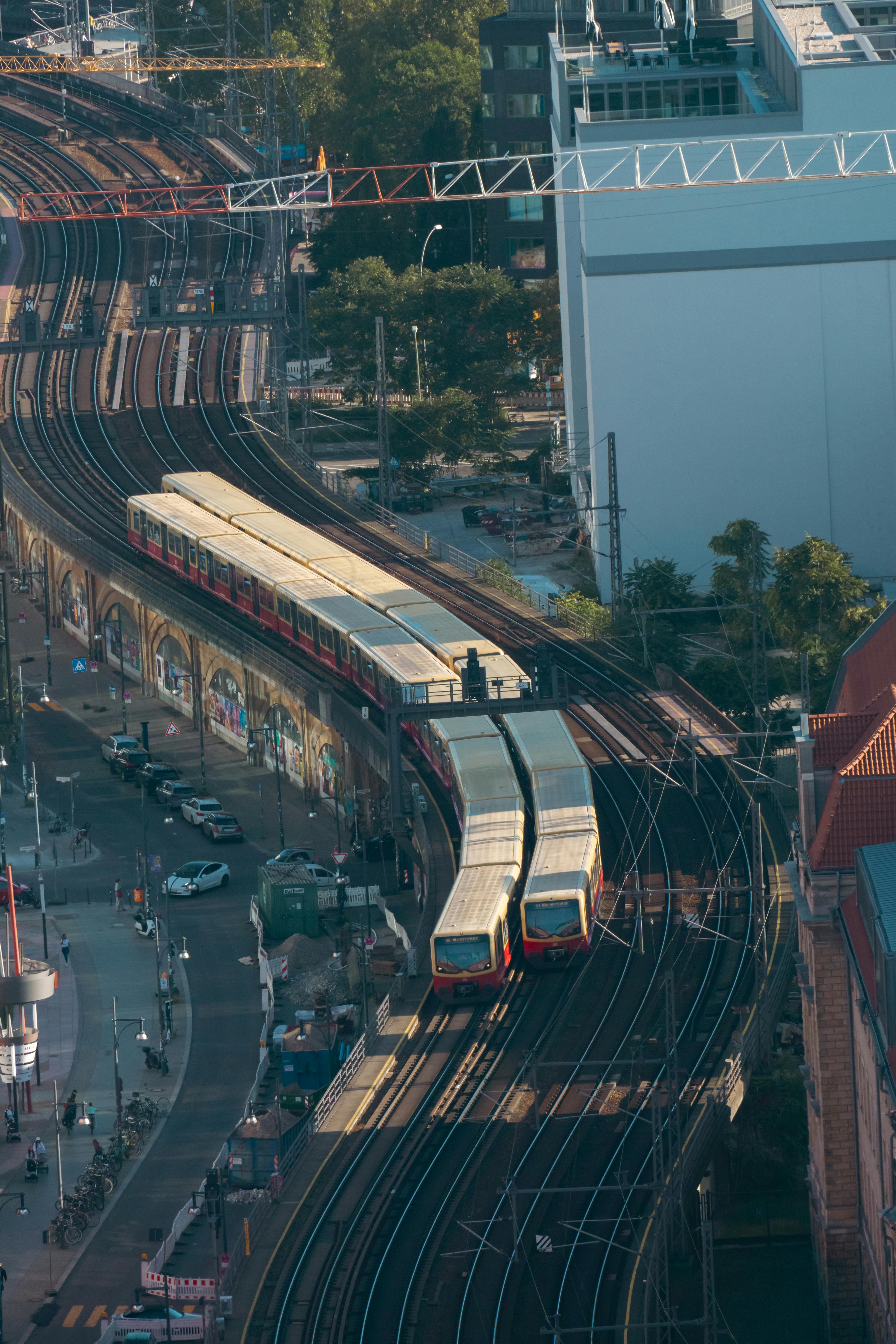 Urban Train Tracks with Commuter Trains · Free Stock Photo