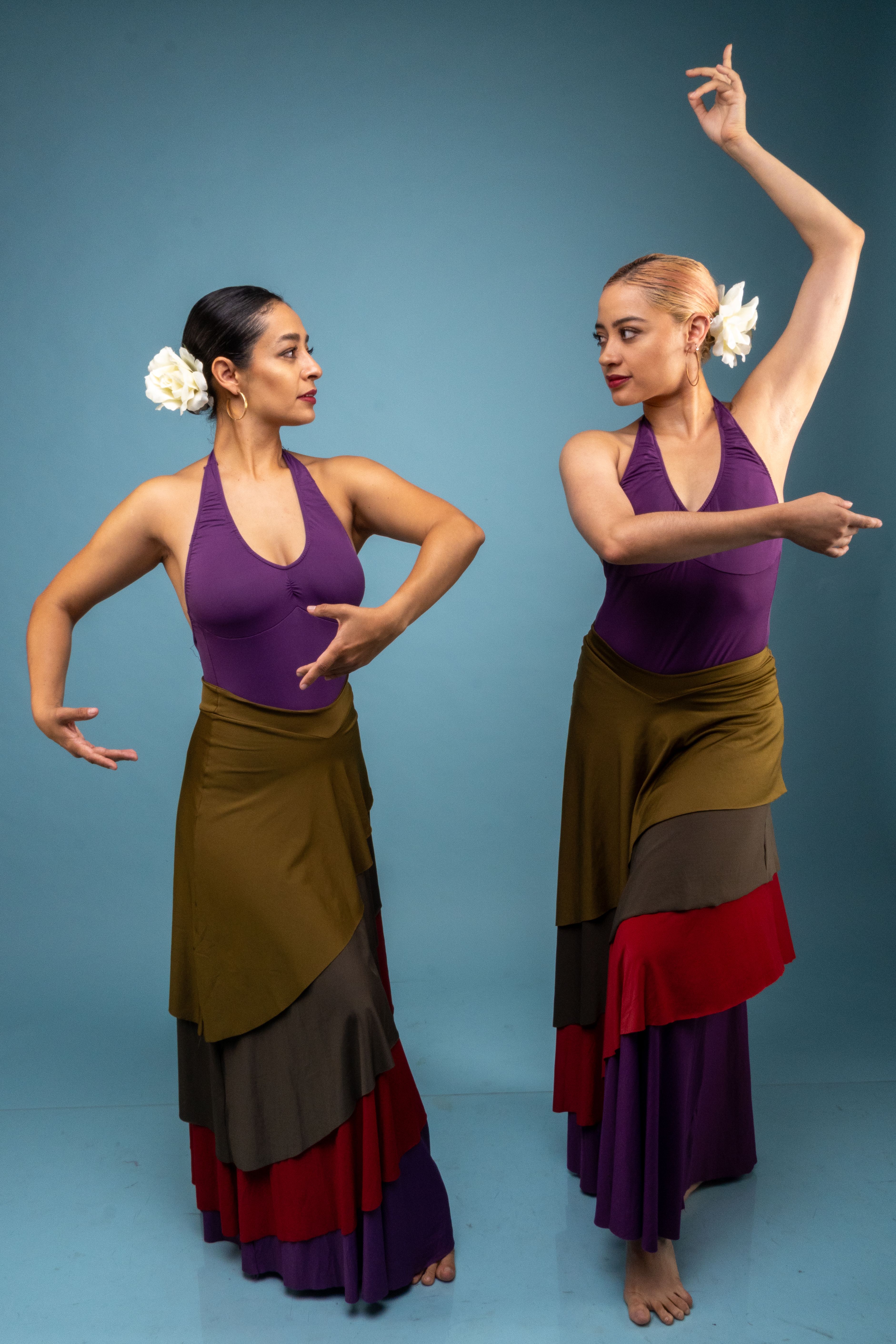 Dynamic Flamenco Dancers in Colorful Skirts · Free Stock Photo