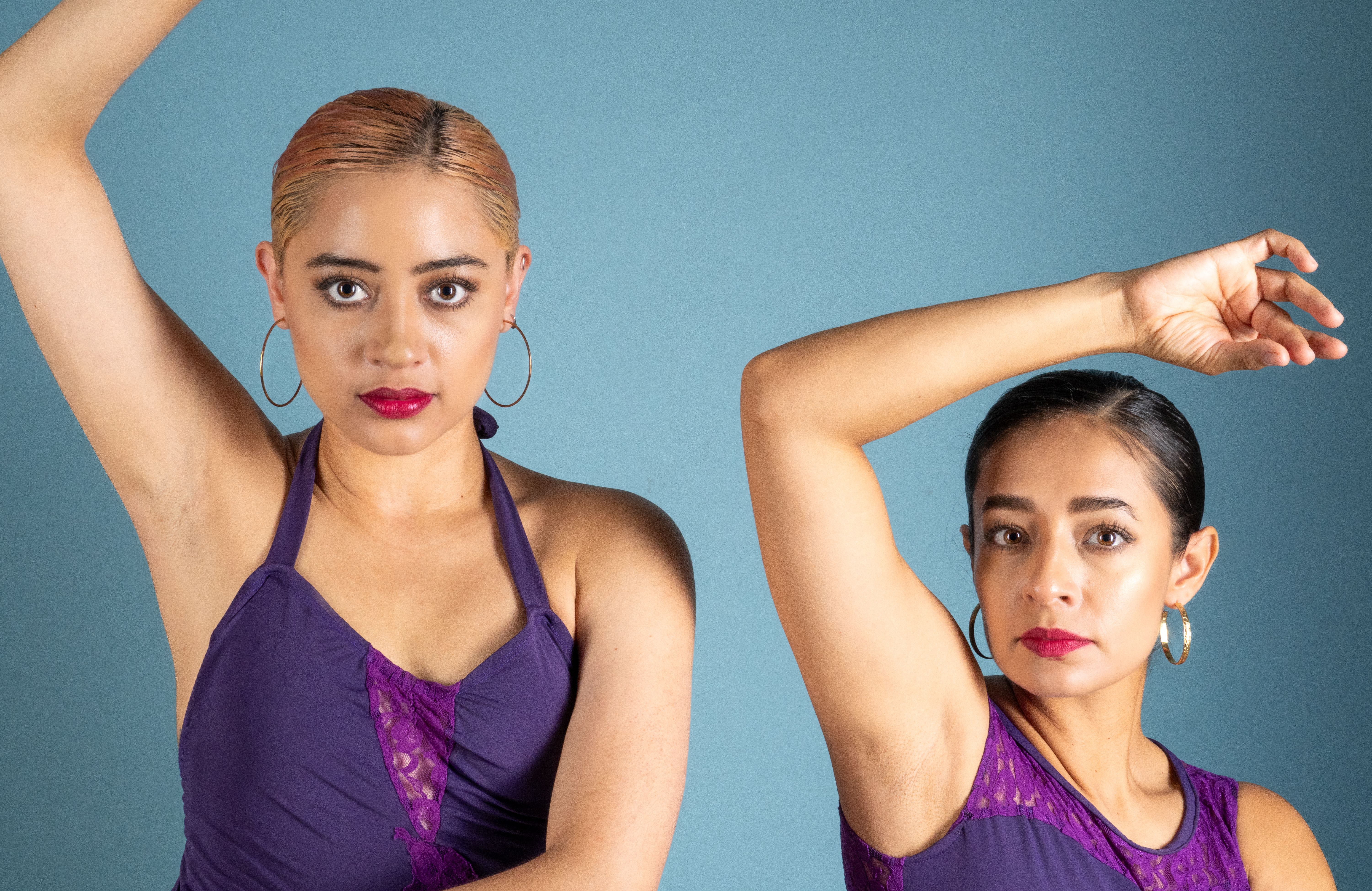 Dynamic Portrait of Female Dancers in Purple Attire · Free Stock Photo