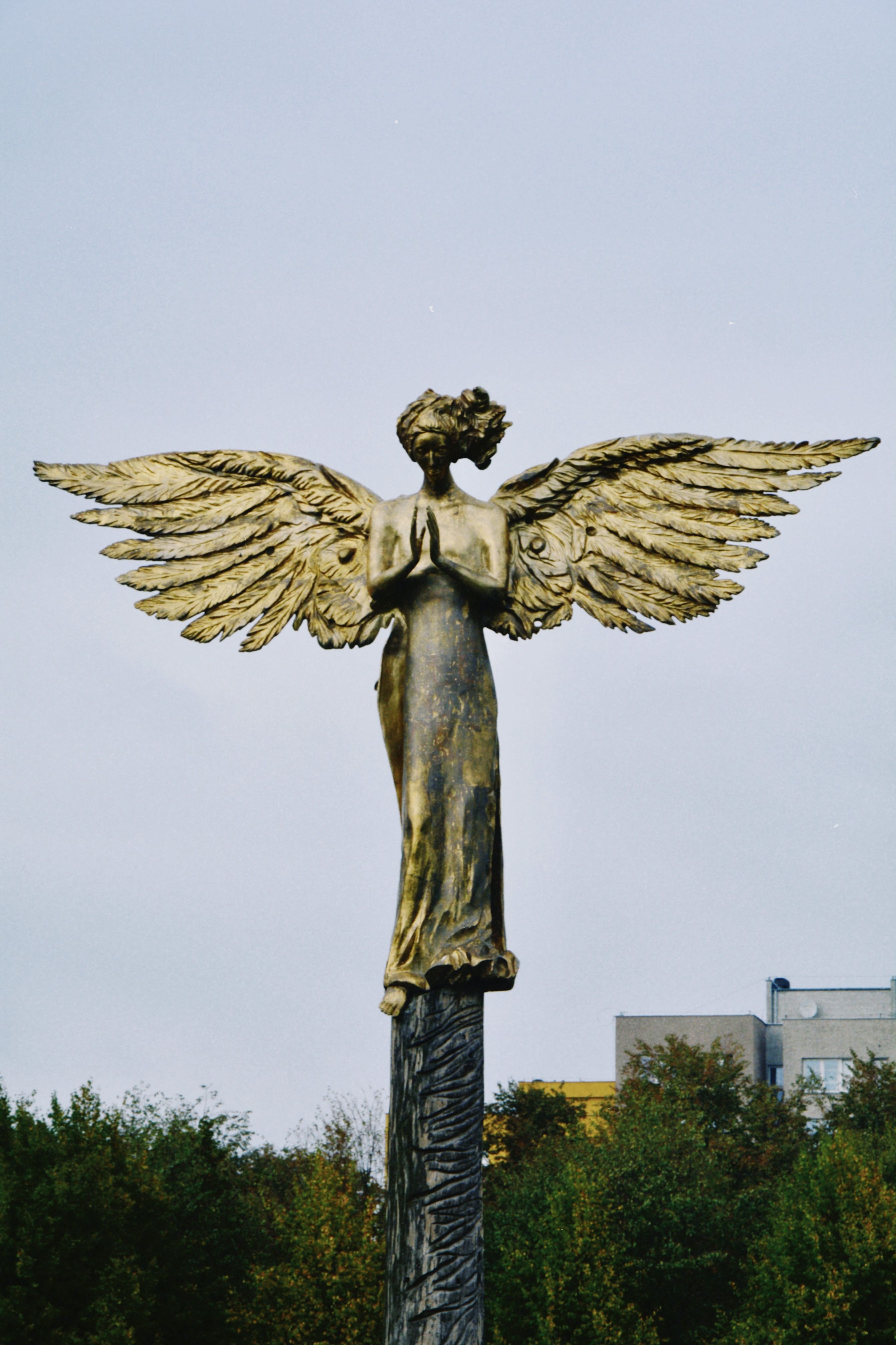 Majestic Angel Statue in Warsaw Park · Free Stock Photo