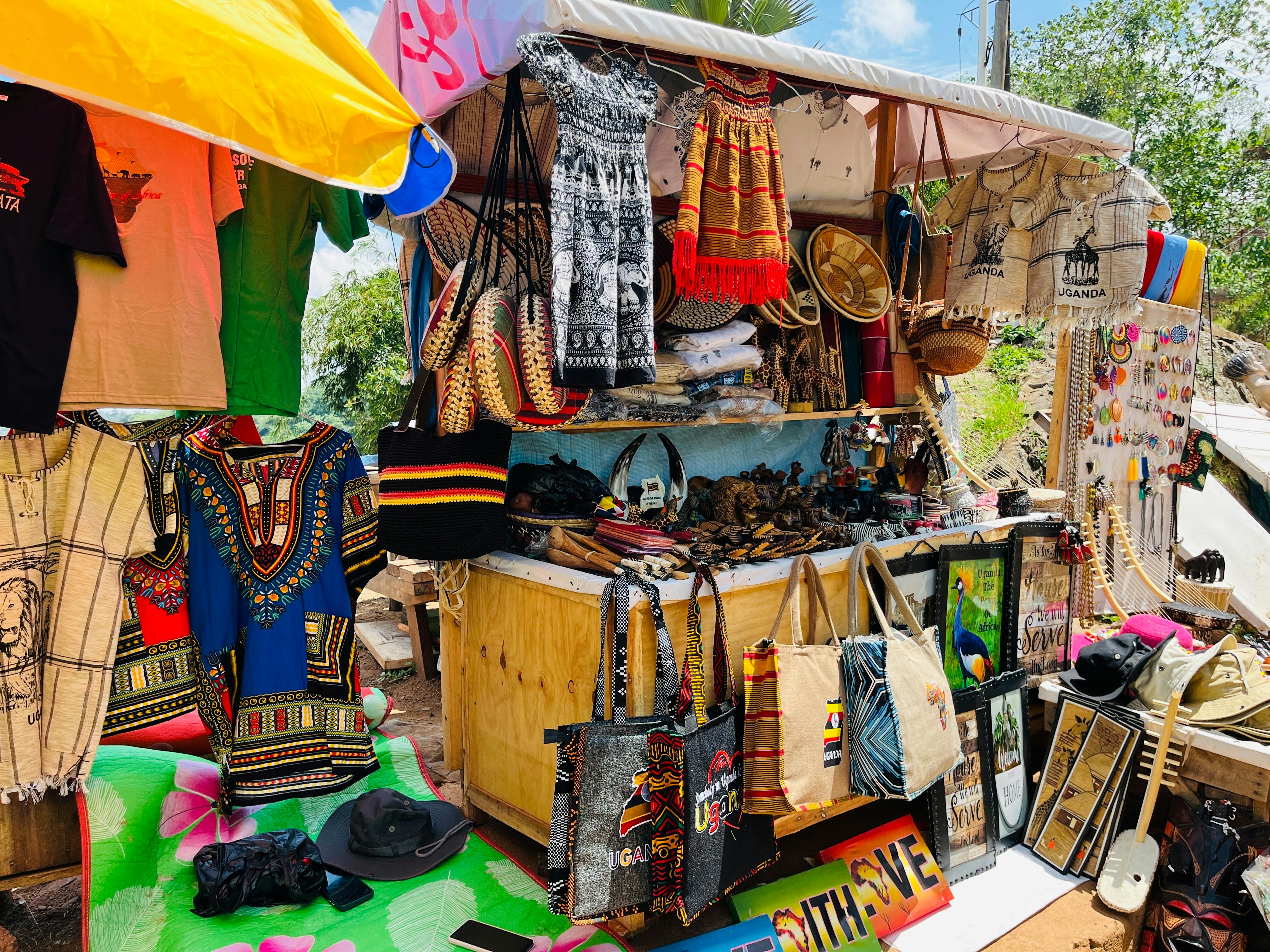 Vibrant African Market Stall with Cultural Goods · Free Stock Photo