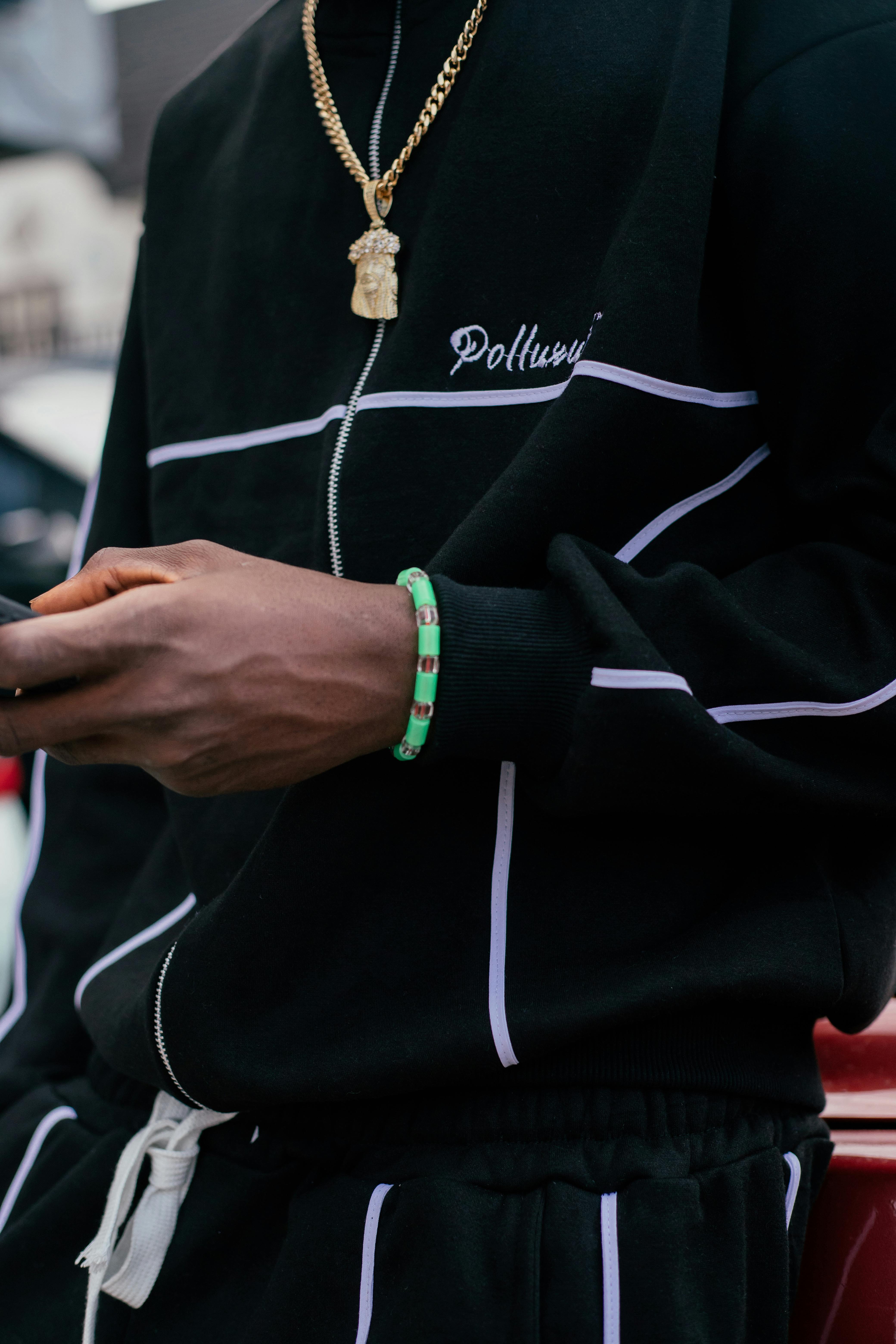 Stylish Black Tracksuit with Gold Chain and Bracelet · Free Stock Photo
