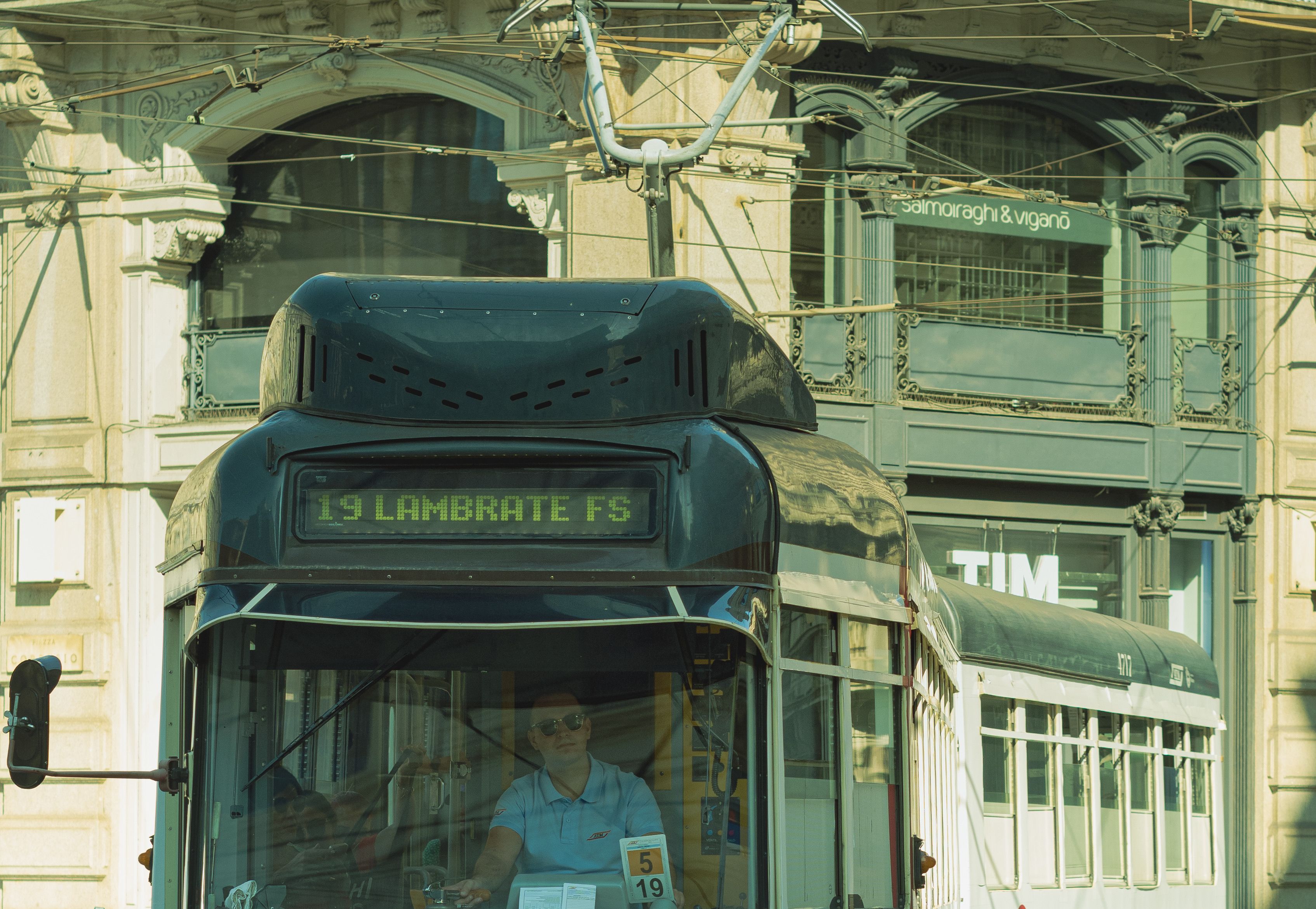 Historic Tram in Bustling Milan Street Scene · Free Stock Photo