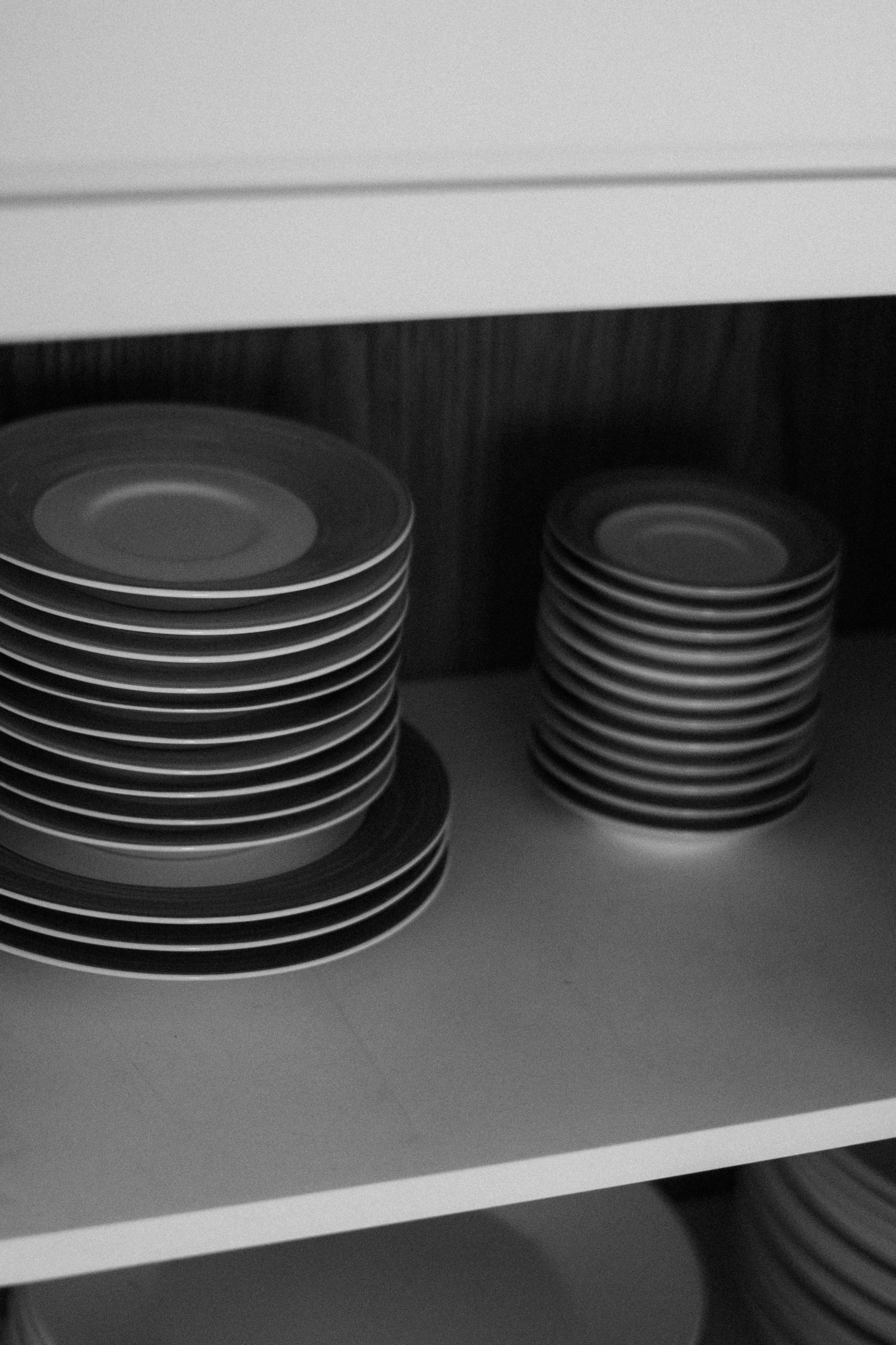 A kitchen with a table and a cabinet · Free Stock Photo