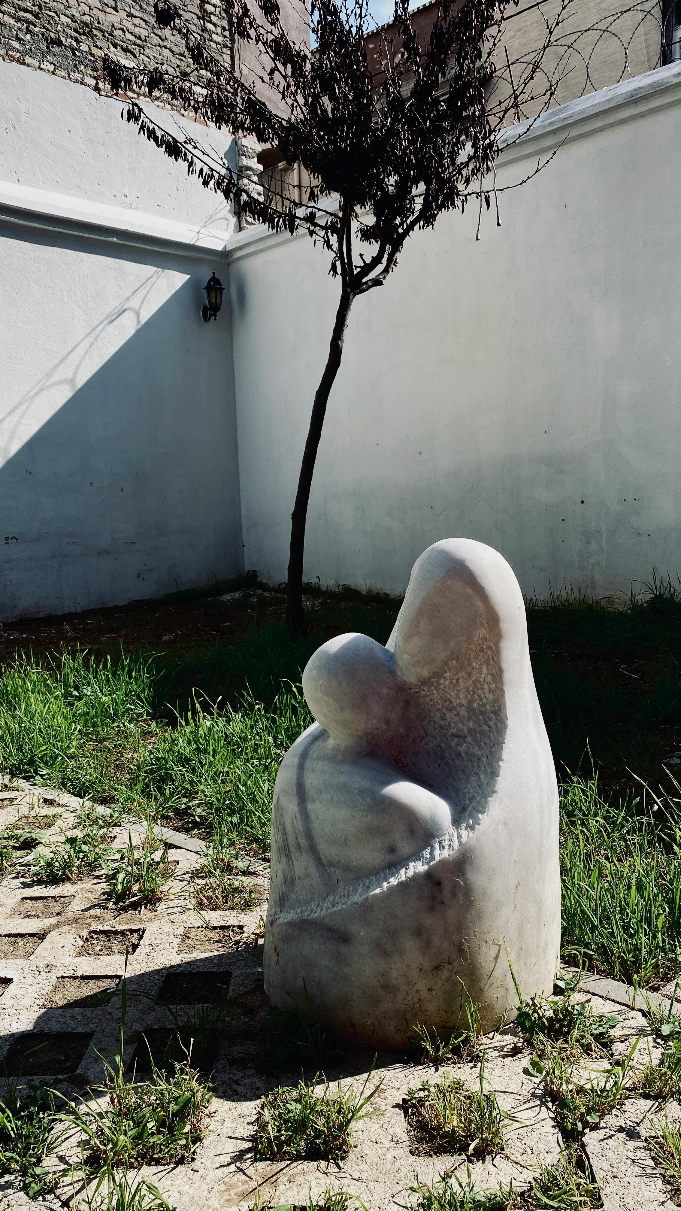 Abstract Garden Stone Sculpture in Sunlight · Free Stock Photo
