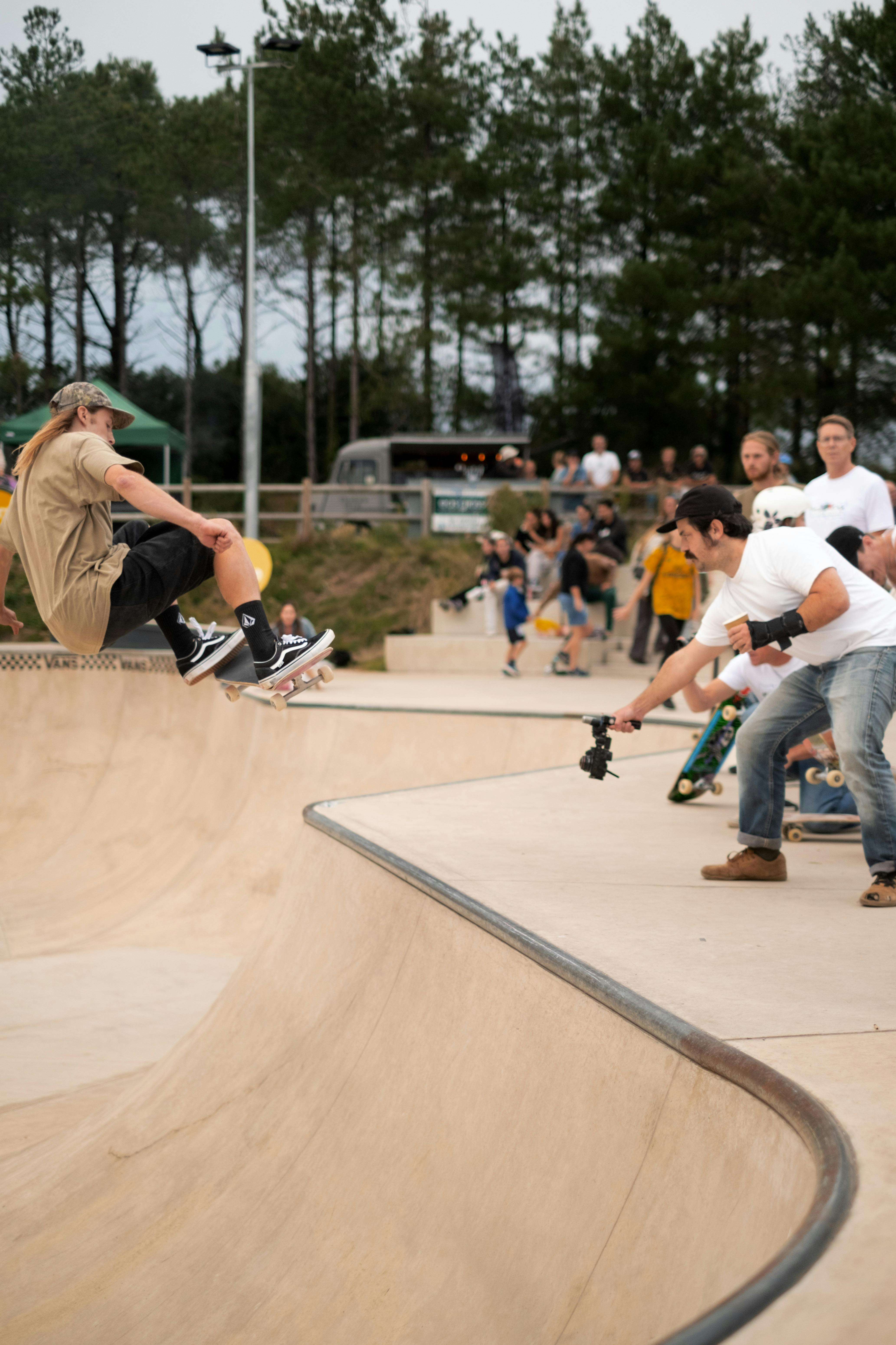 Dynamic Skateboard Trick in Outdoor Skate Park · Free Stock Photo