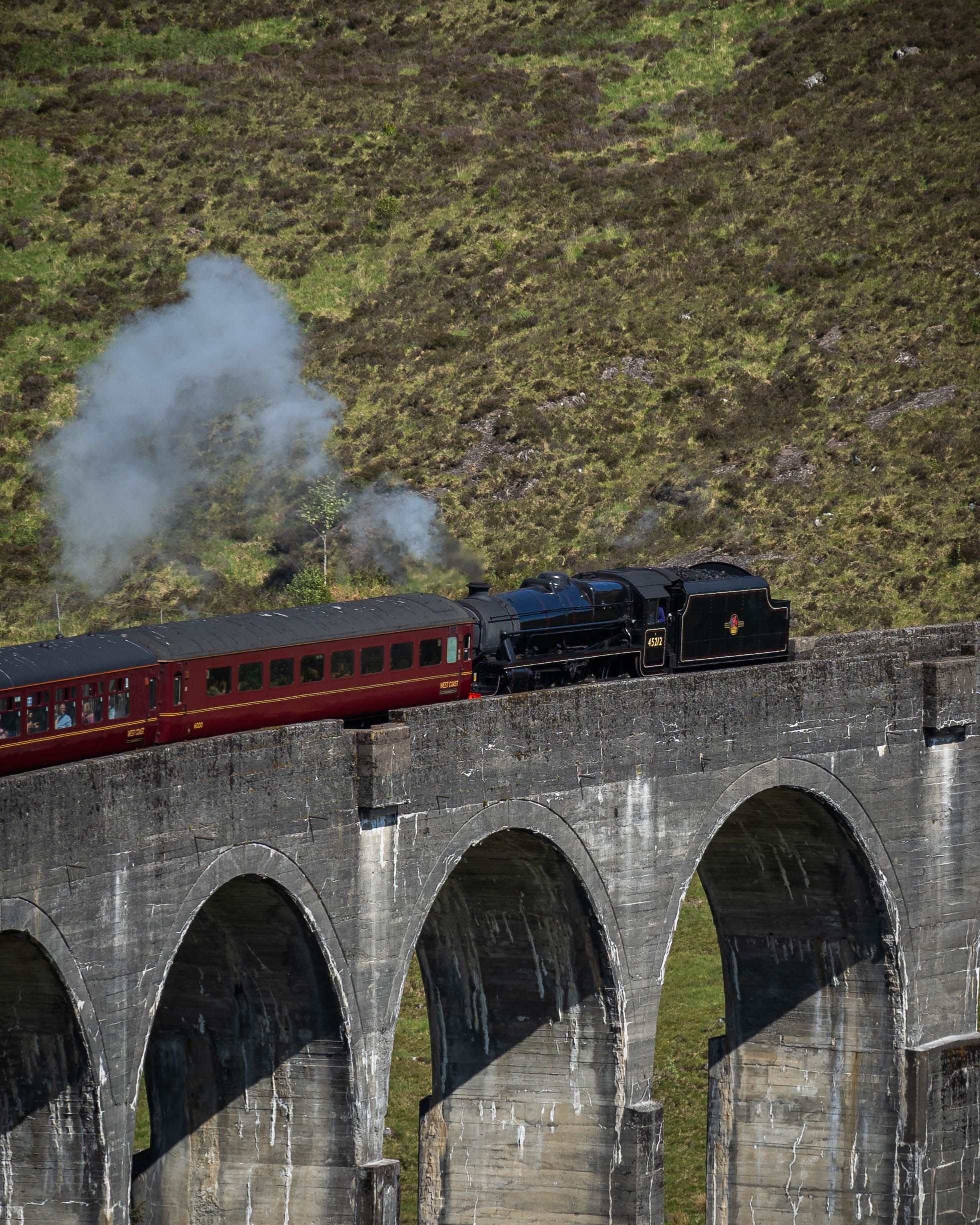 Steam Train Crossing Iconic Railway Viaduct · Free Stock Photo