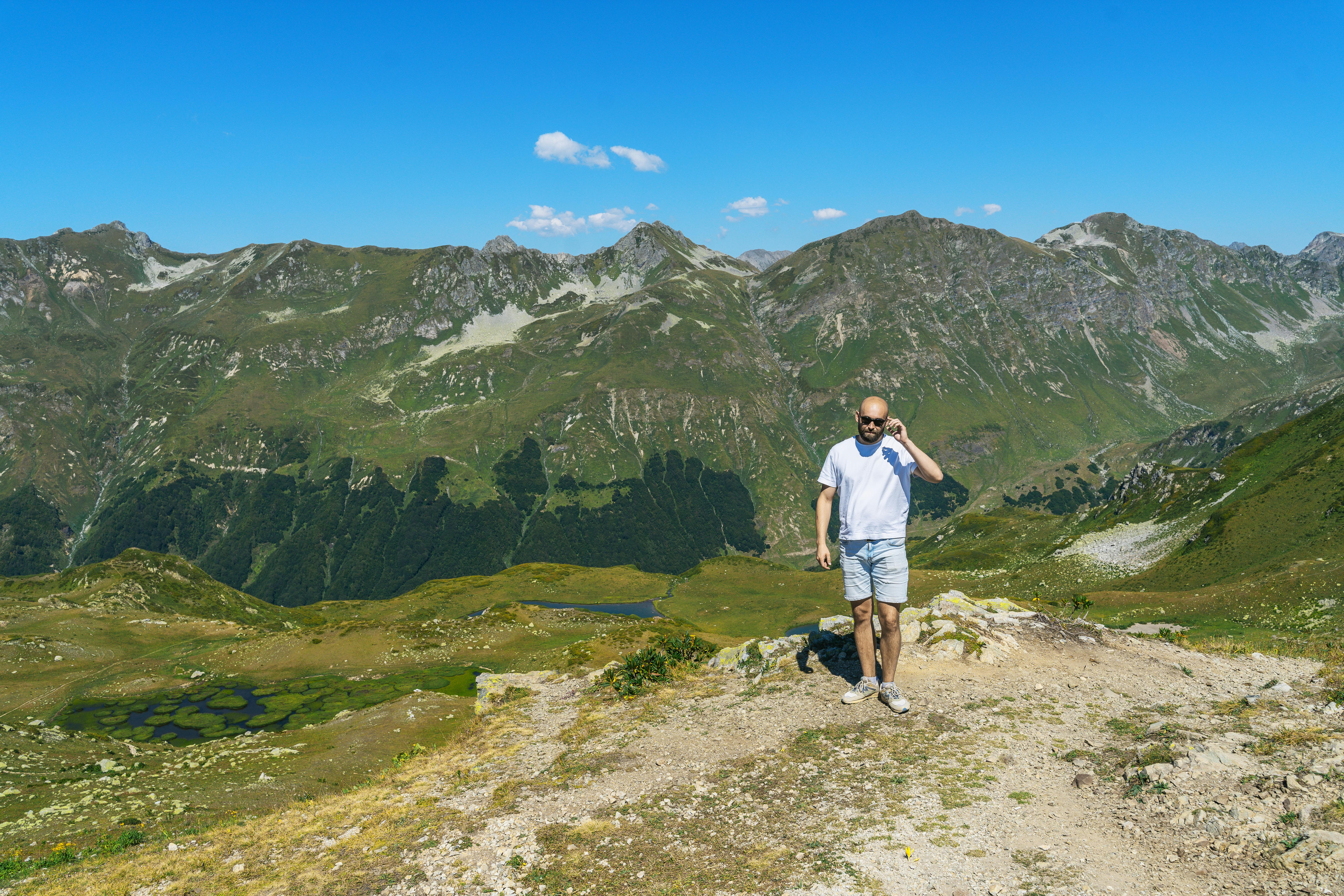 Hiker Enjoying Scenic Mountain View in Abkhazia · Free Stock Photo