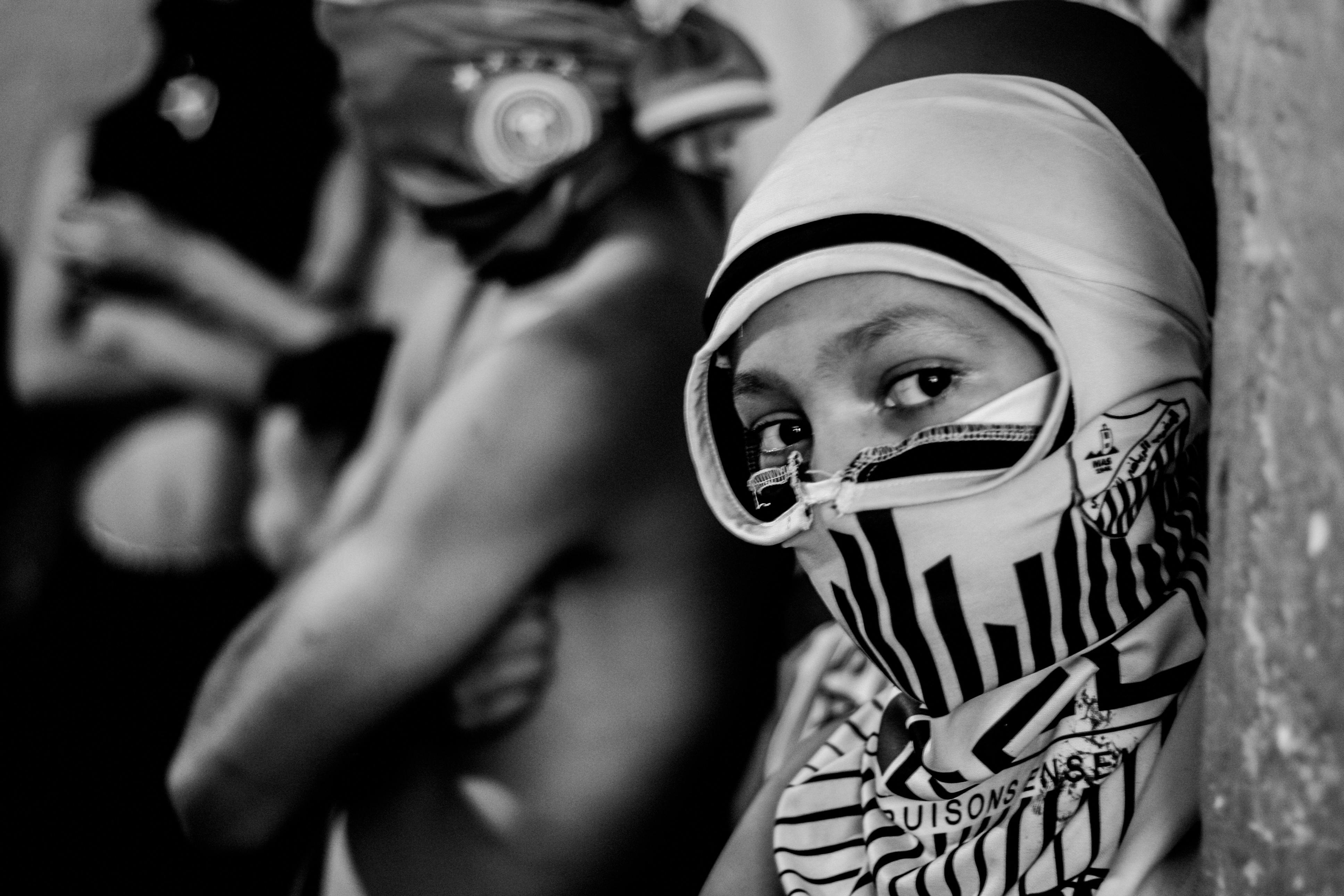 Masked Figures in Black and White Portrait · Free Stock Photo