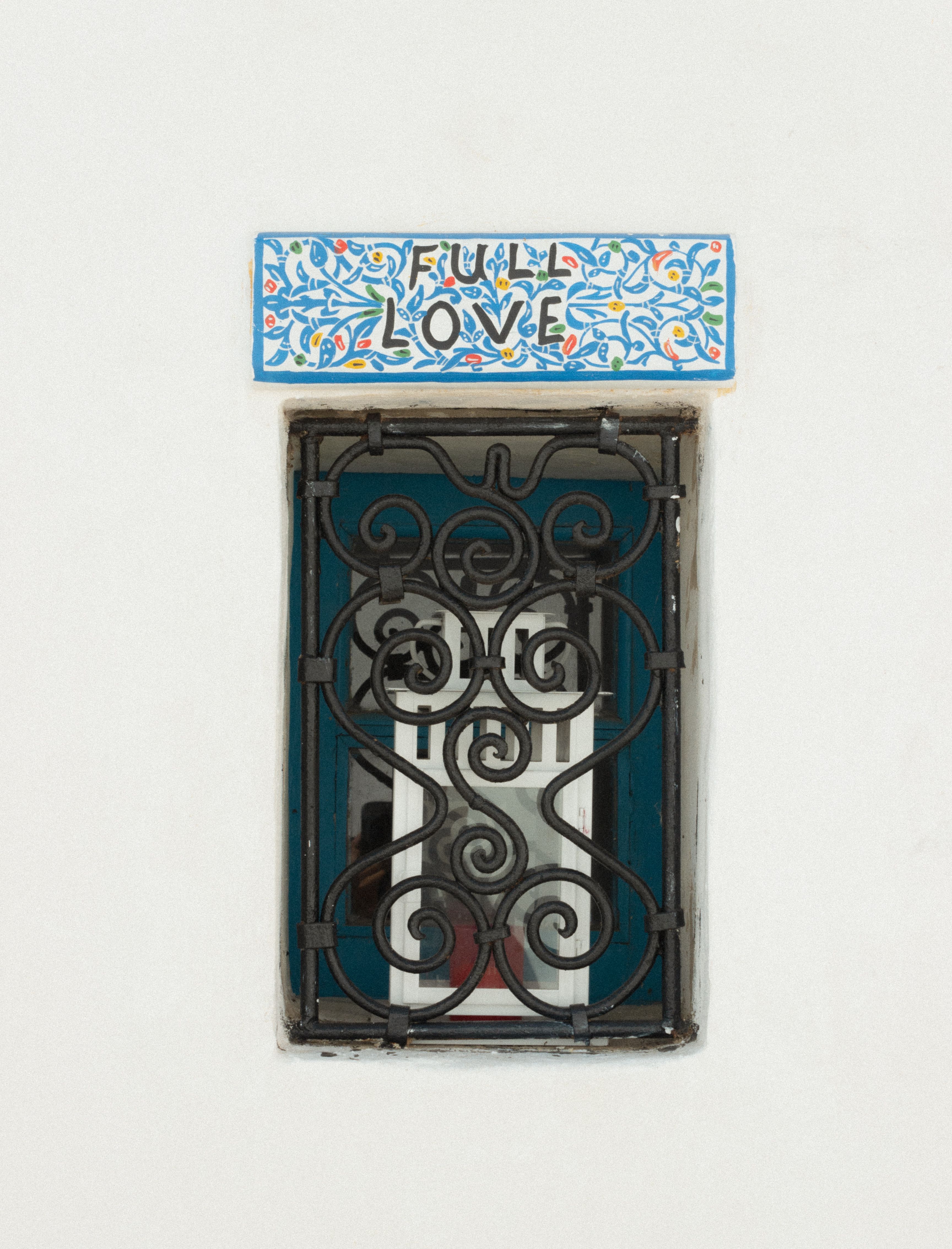 Decorative Window with Iron Grate and Love Sign · Free Stock Photo