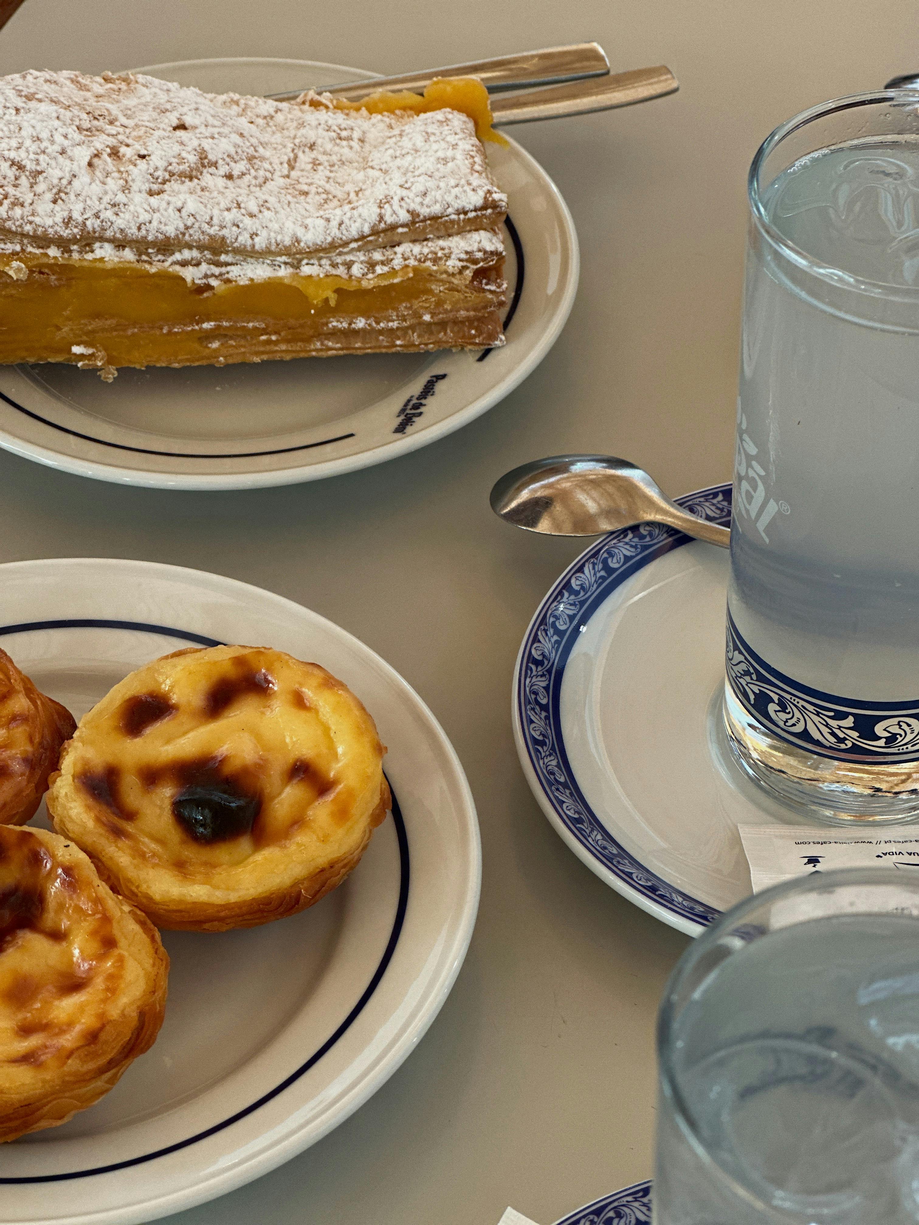 Two Baked Pastries in Plate on Table · Free Stock Photo