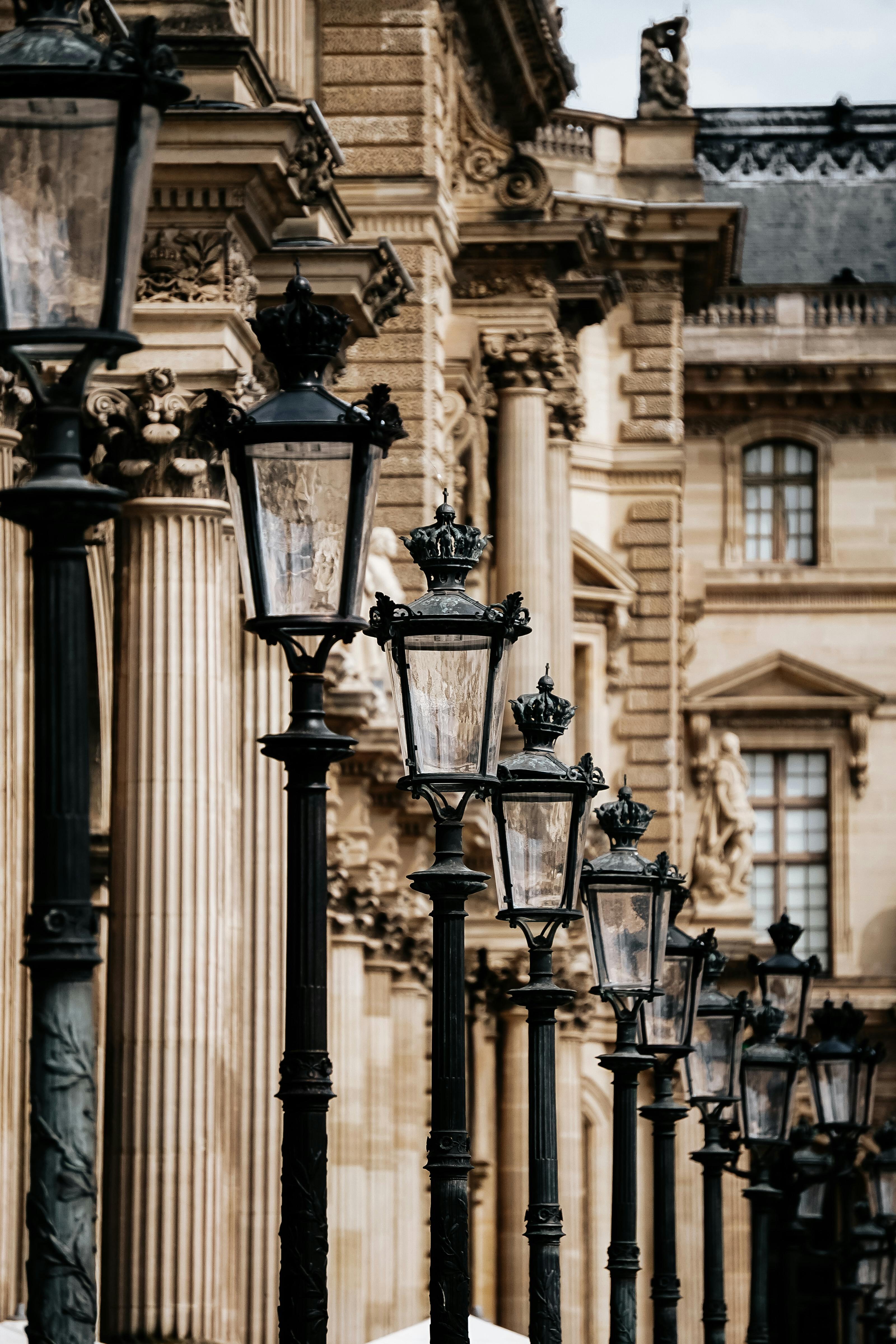 Elegant Row of Vintage Lamp Posts at European Landmark · Free Stock Photo
