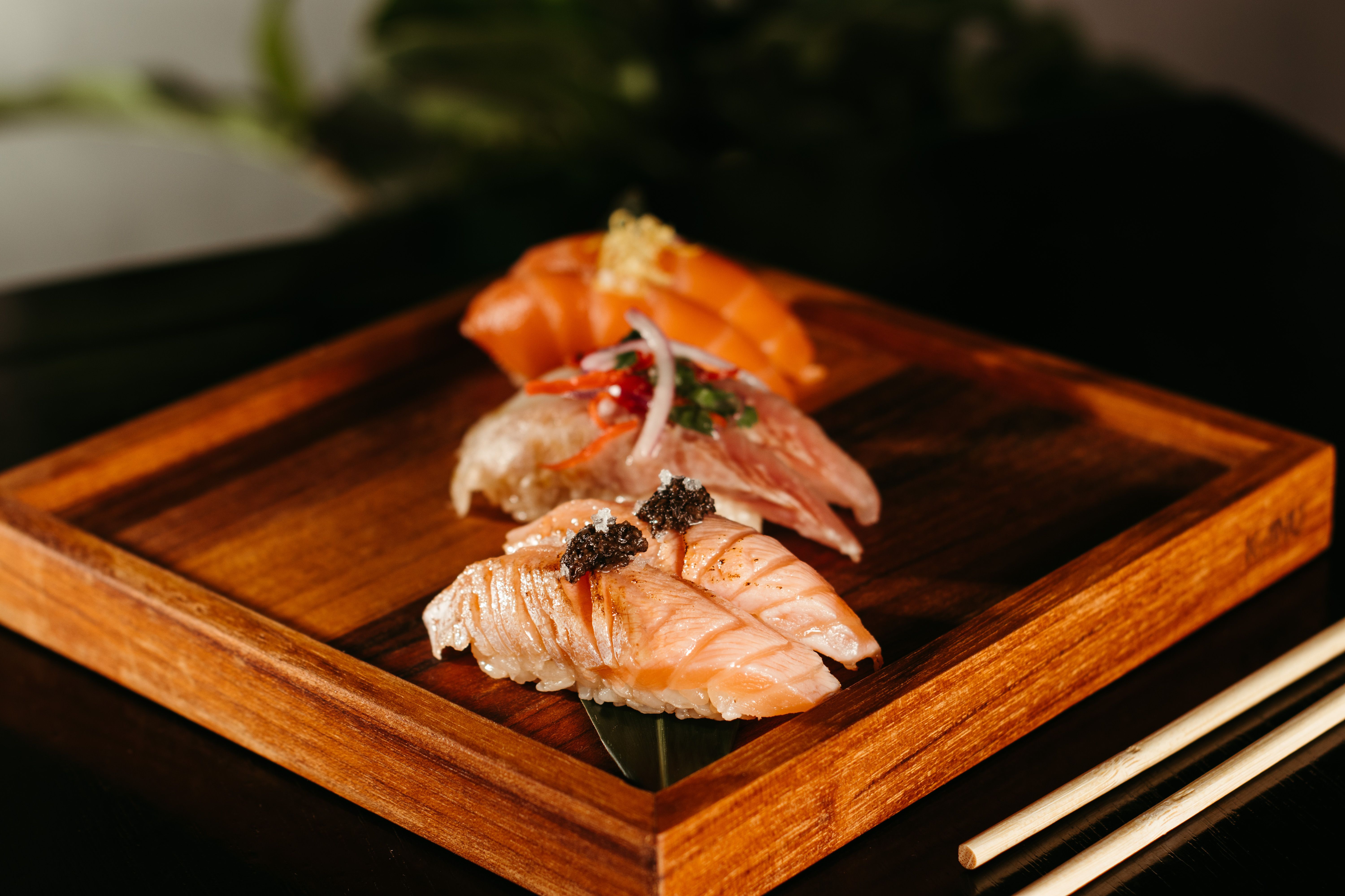 Elegant Sushi Presentation on Wooden Tray · Free Stock Photo