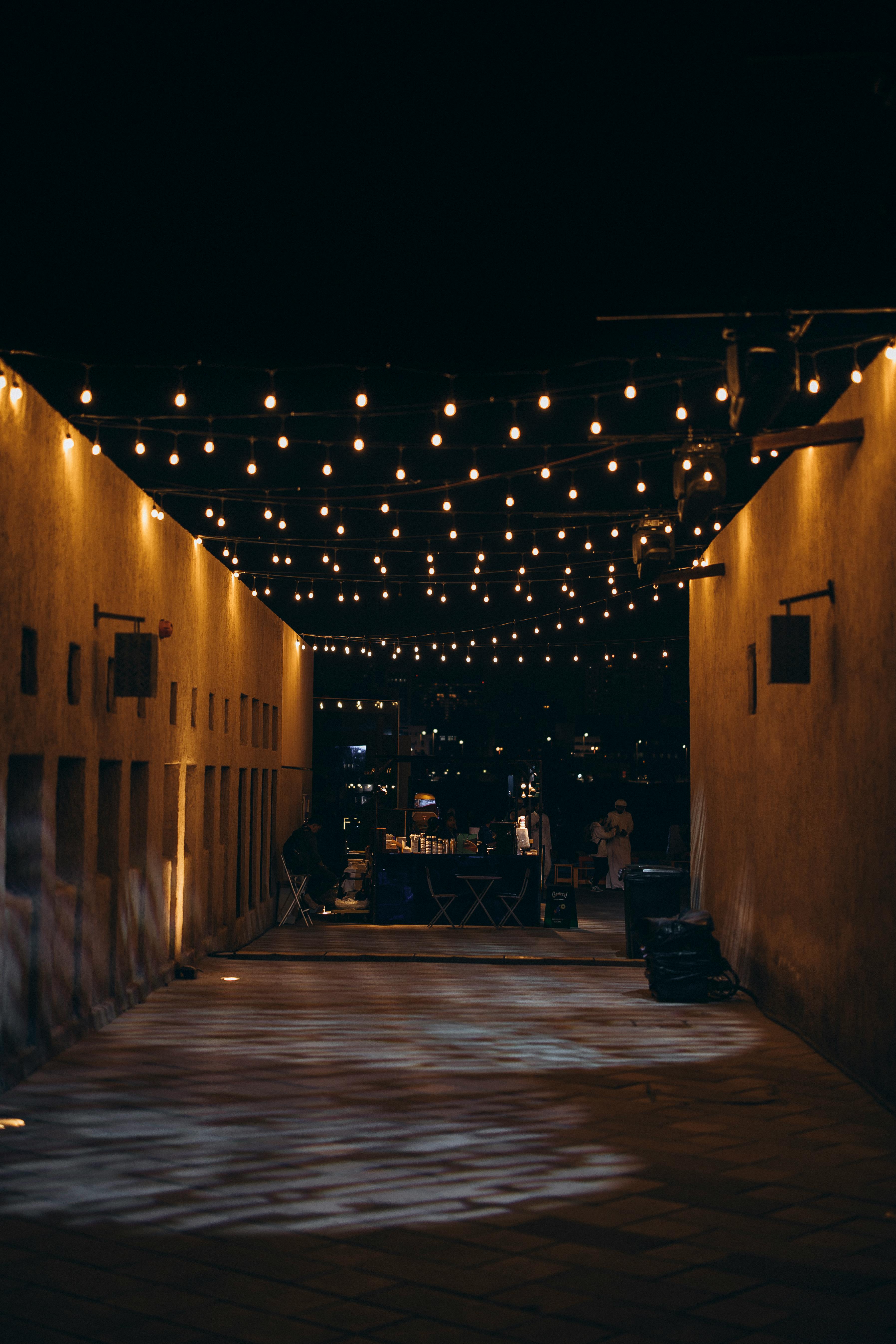 Charming Dubai Alleyway with String Lights at Night · Free Stock Photo