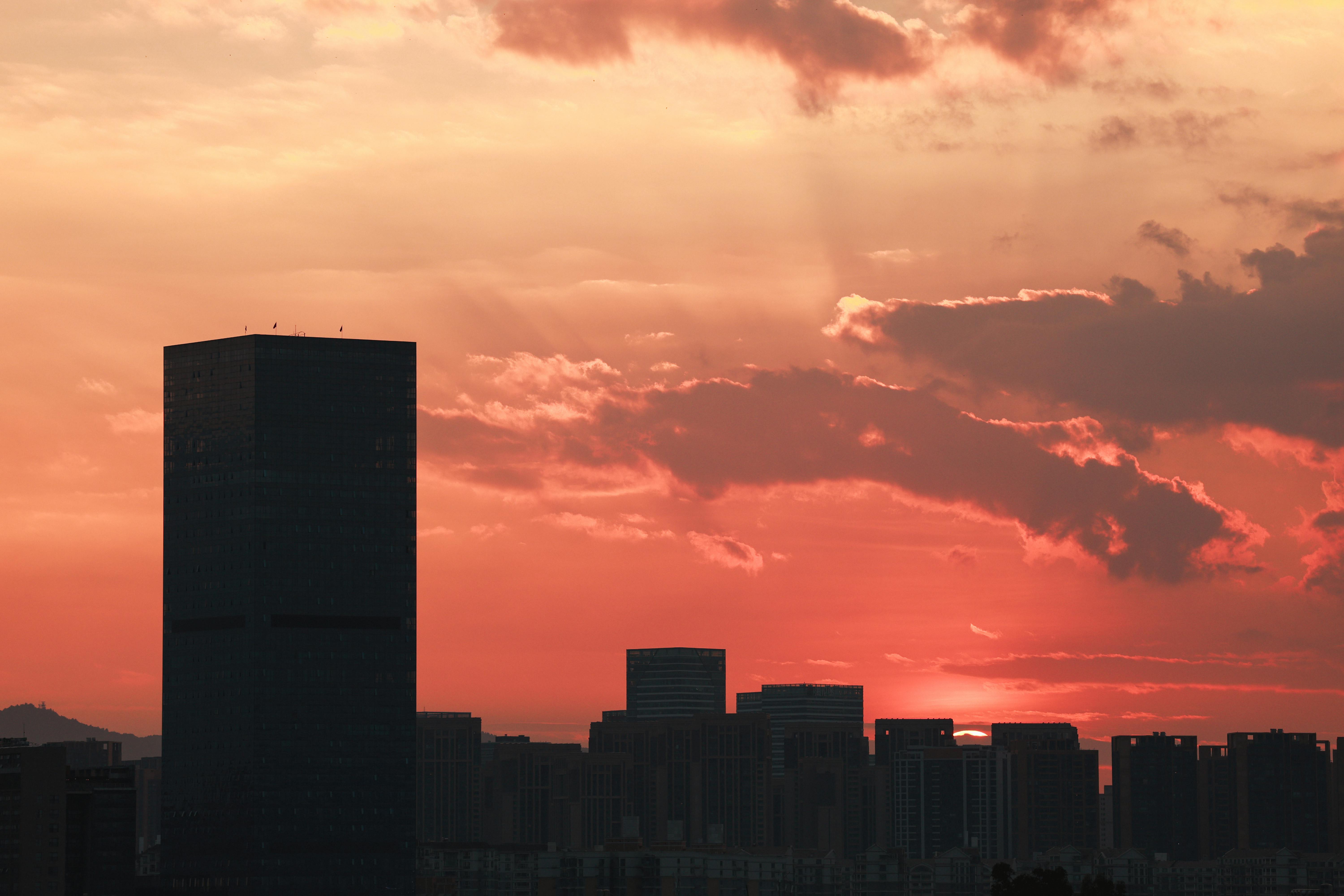 Dramatic City Skyline at Sunset · Free Stock Photo