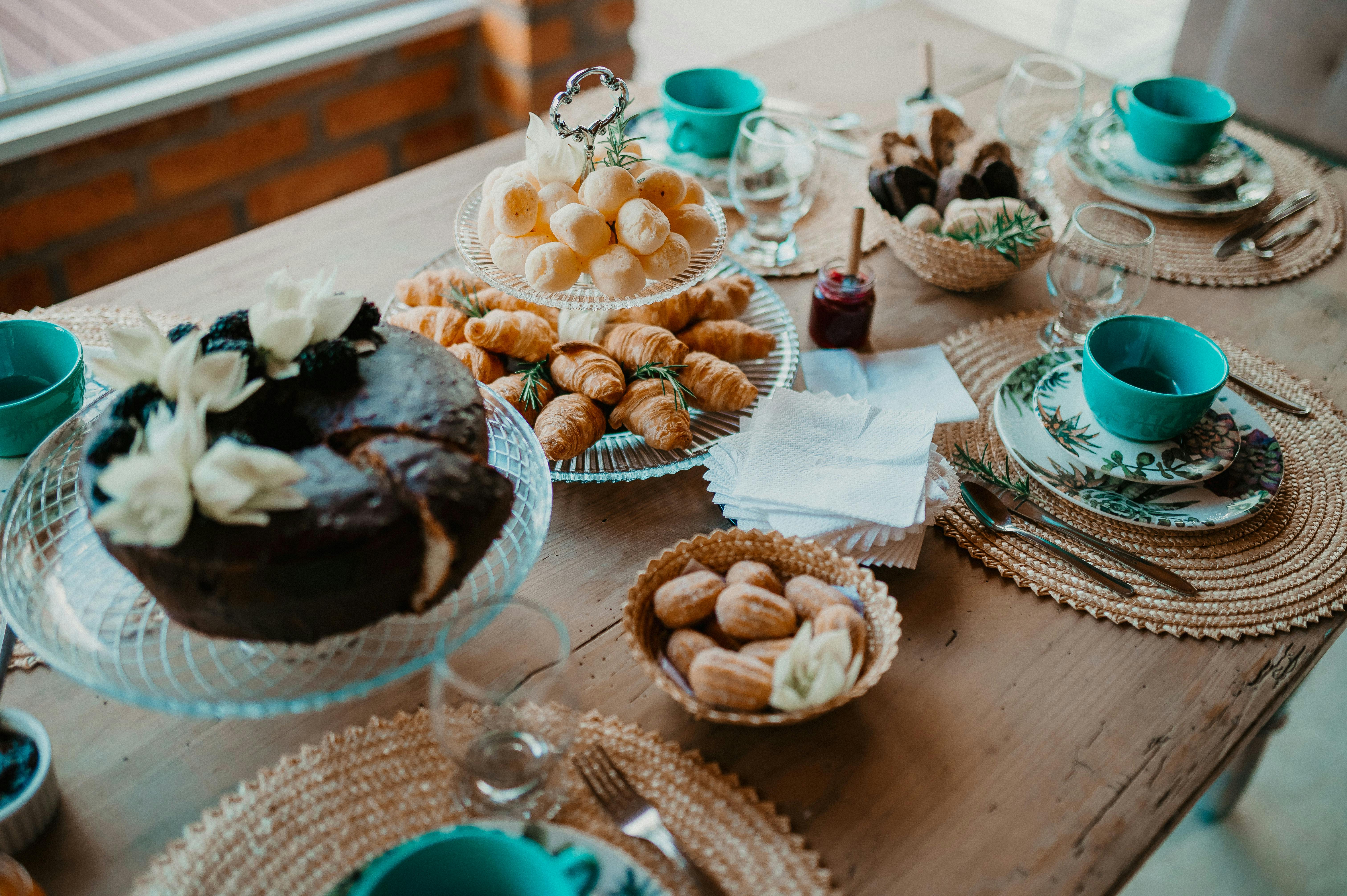 Elegant Brunch Table Setting with Pastries · Free Stock Photo