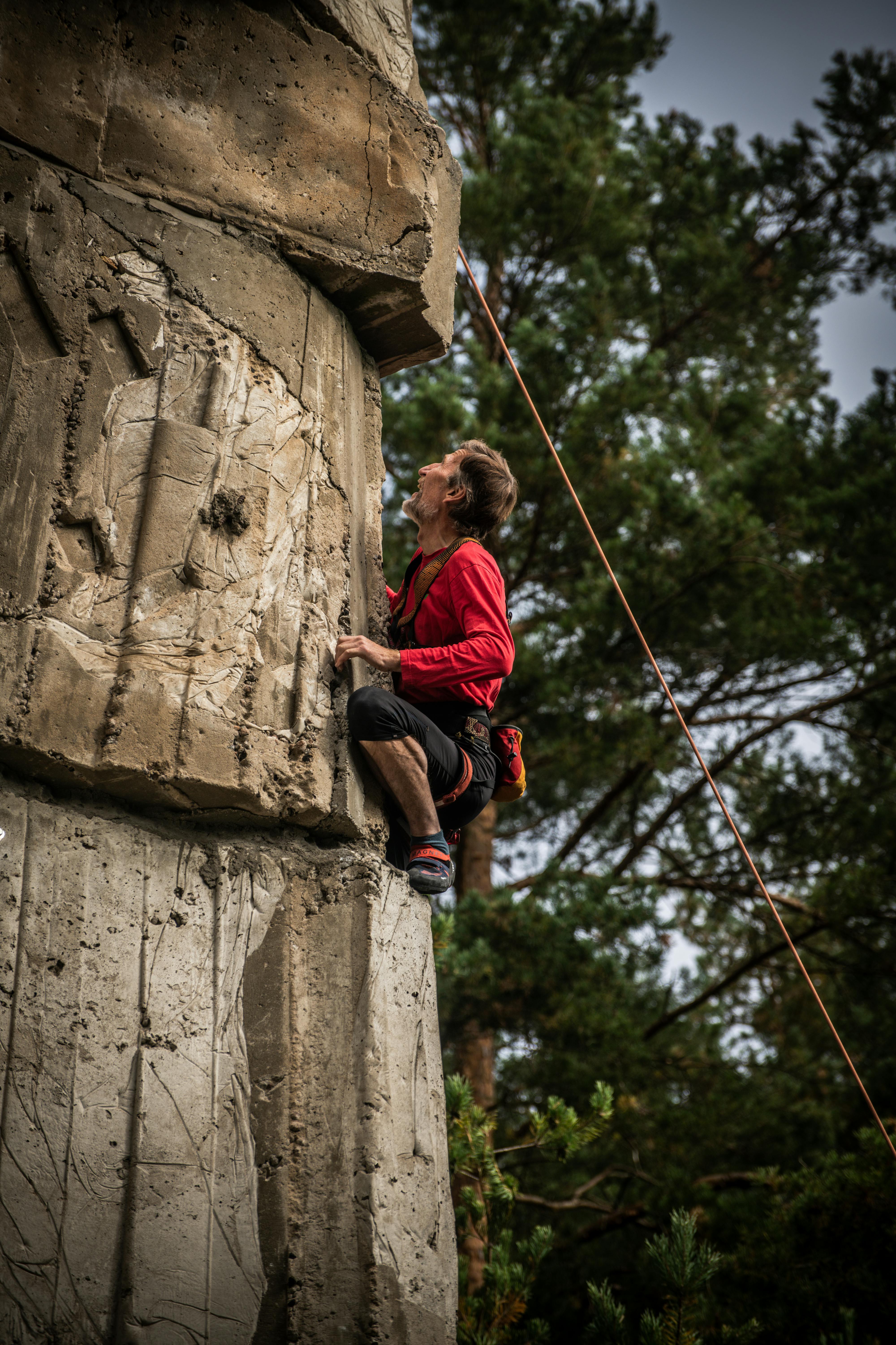 Rock Climber Scaling Outdoor Wall in Kaunas · Free Stock Photo