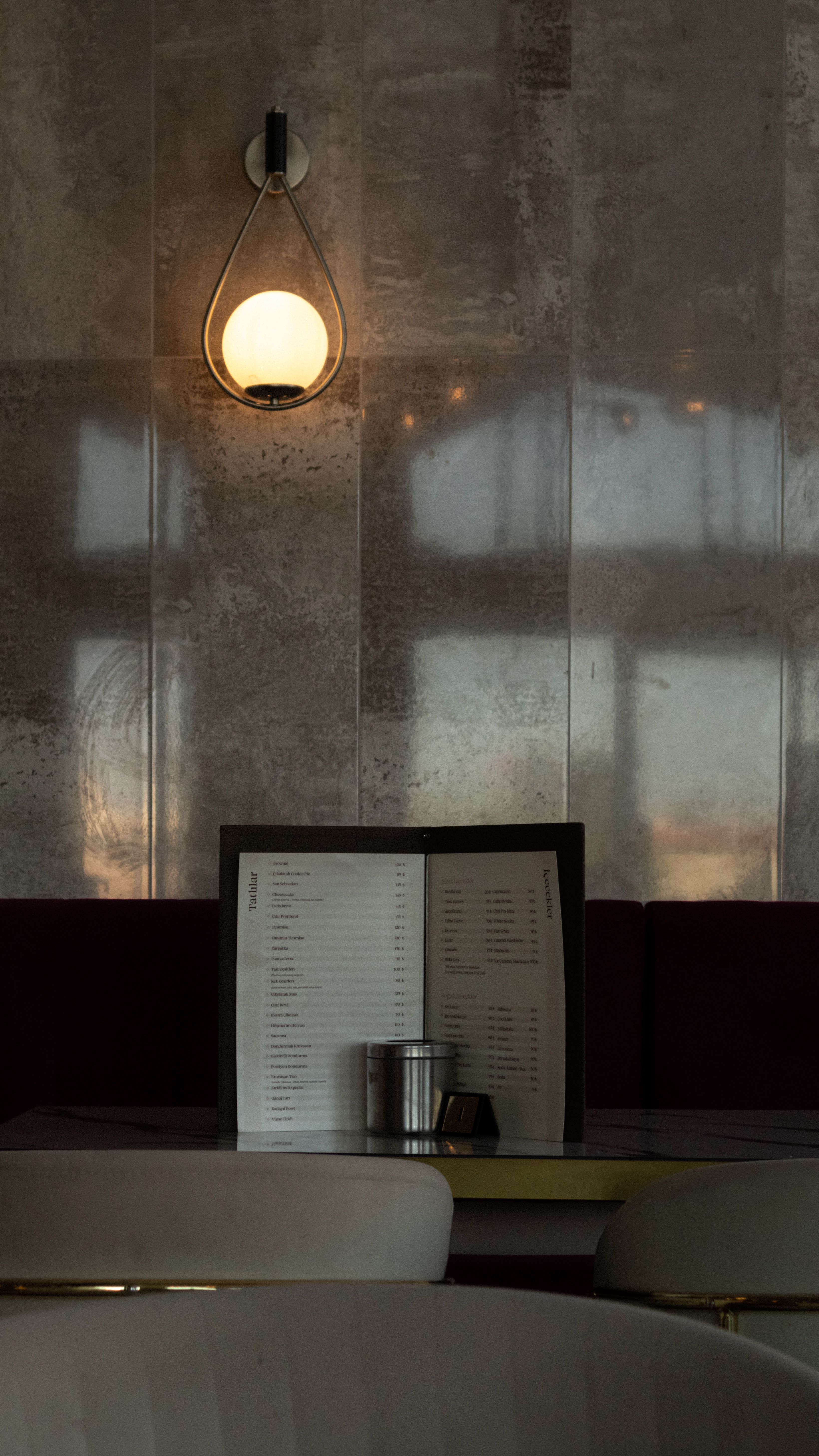 Cozy Café Ambiance with Menu Displayed · Free Stock Photo