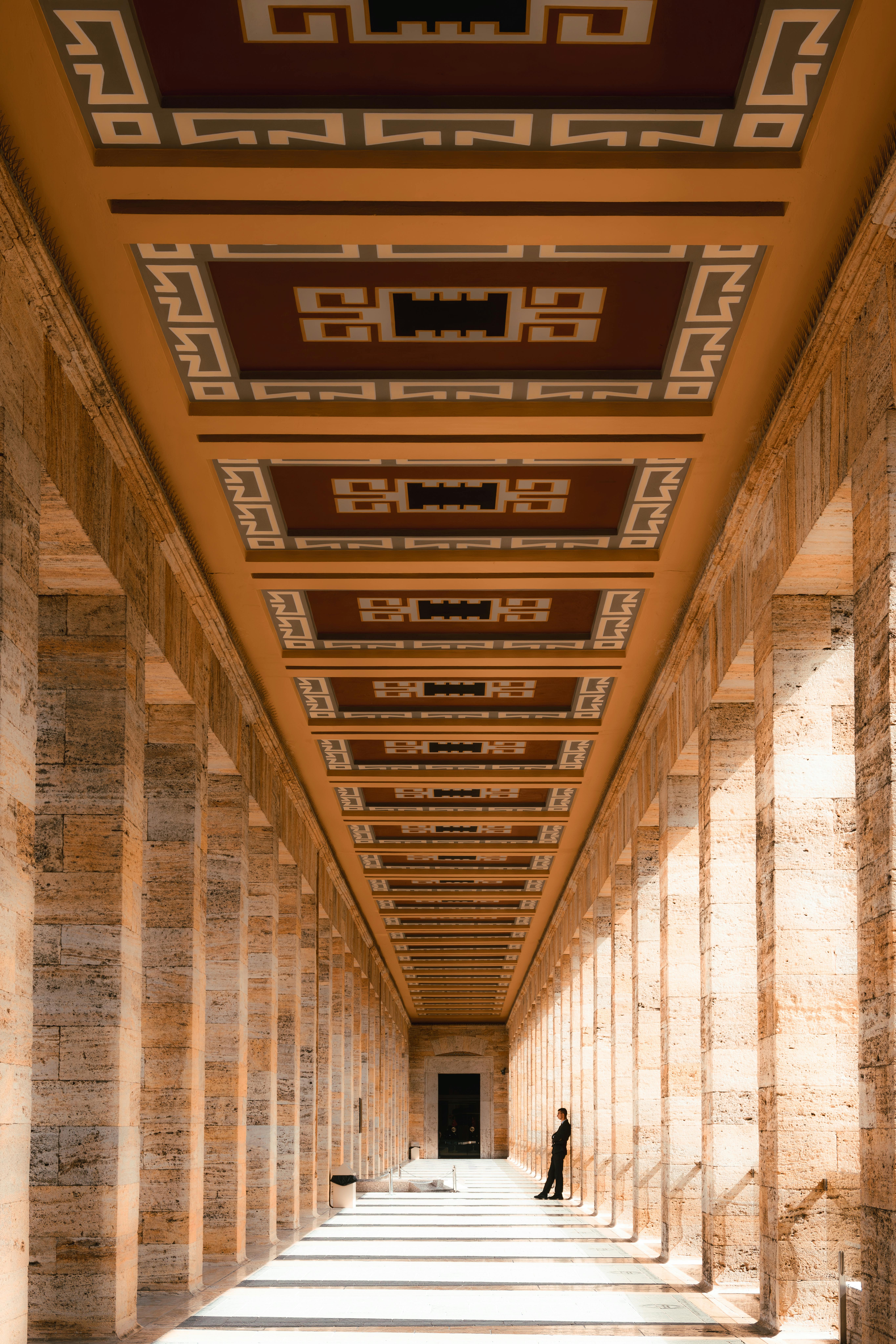 Stunning Architectural Corridor with Columns · Free Stock Photo