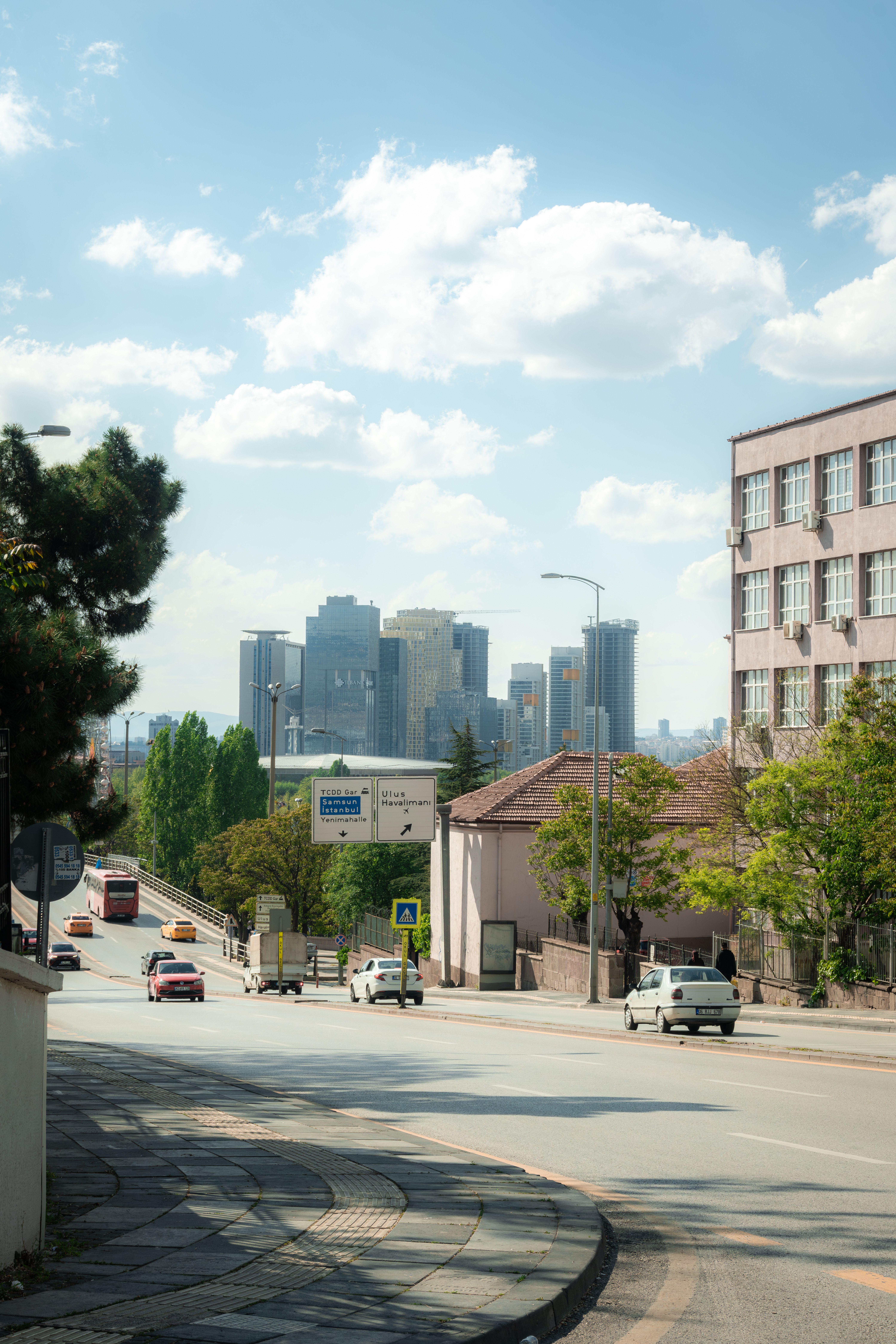 Urban Street View with Distant Skyscrapers · Free Stock Photo