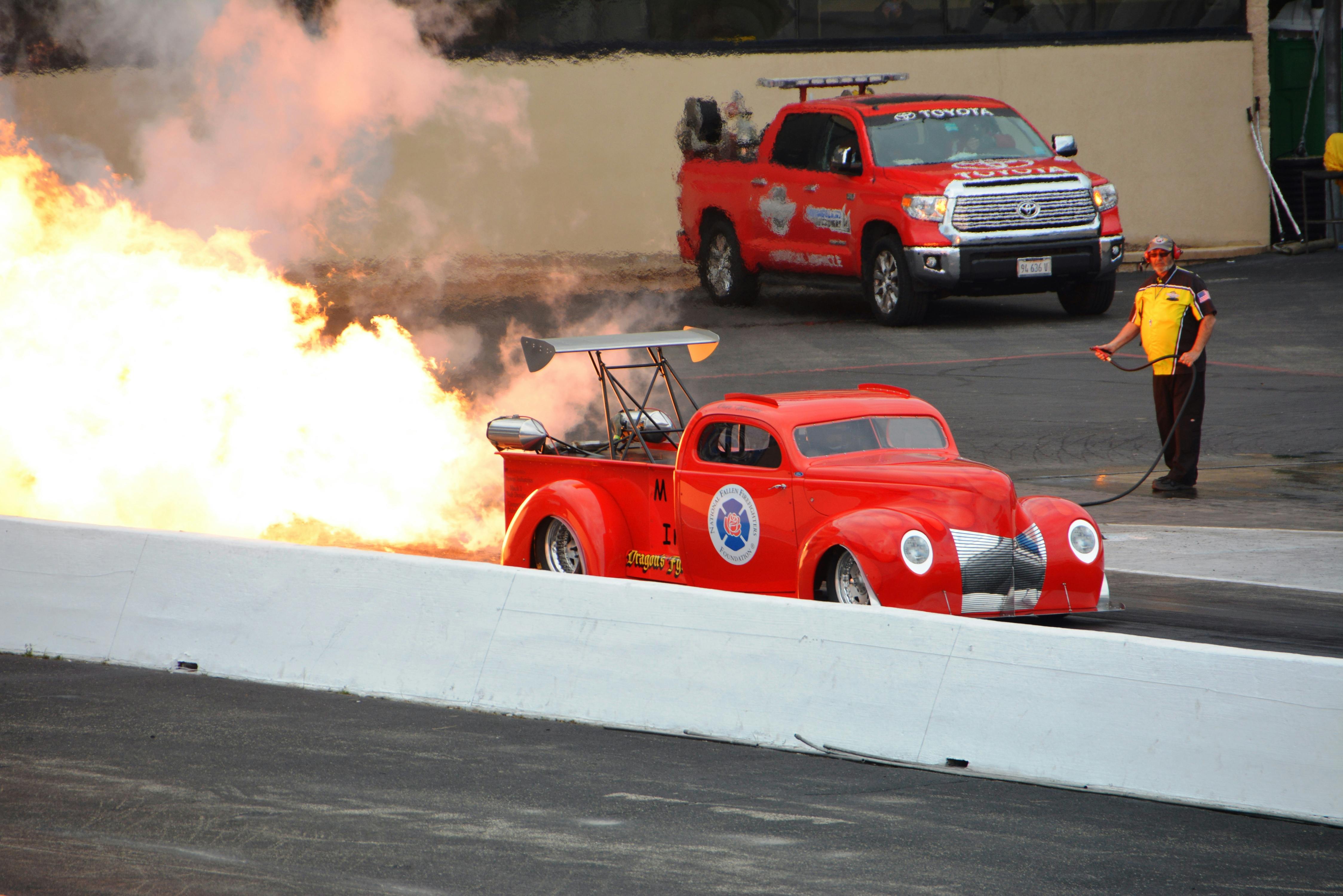 Red Dragster Car on Fire at Race Track · Free Stock Photo