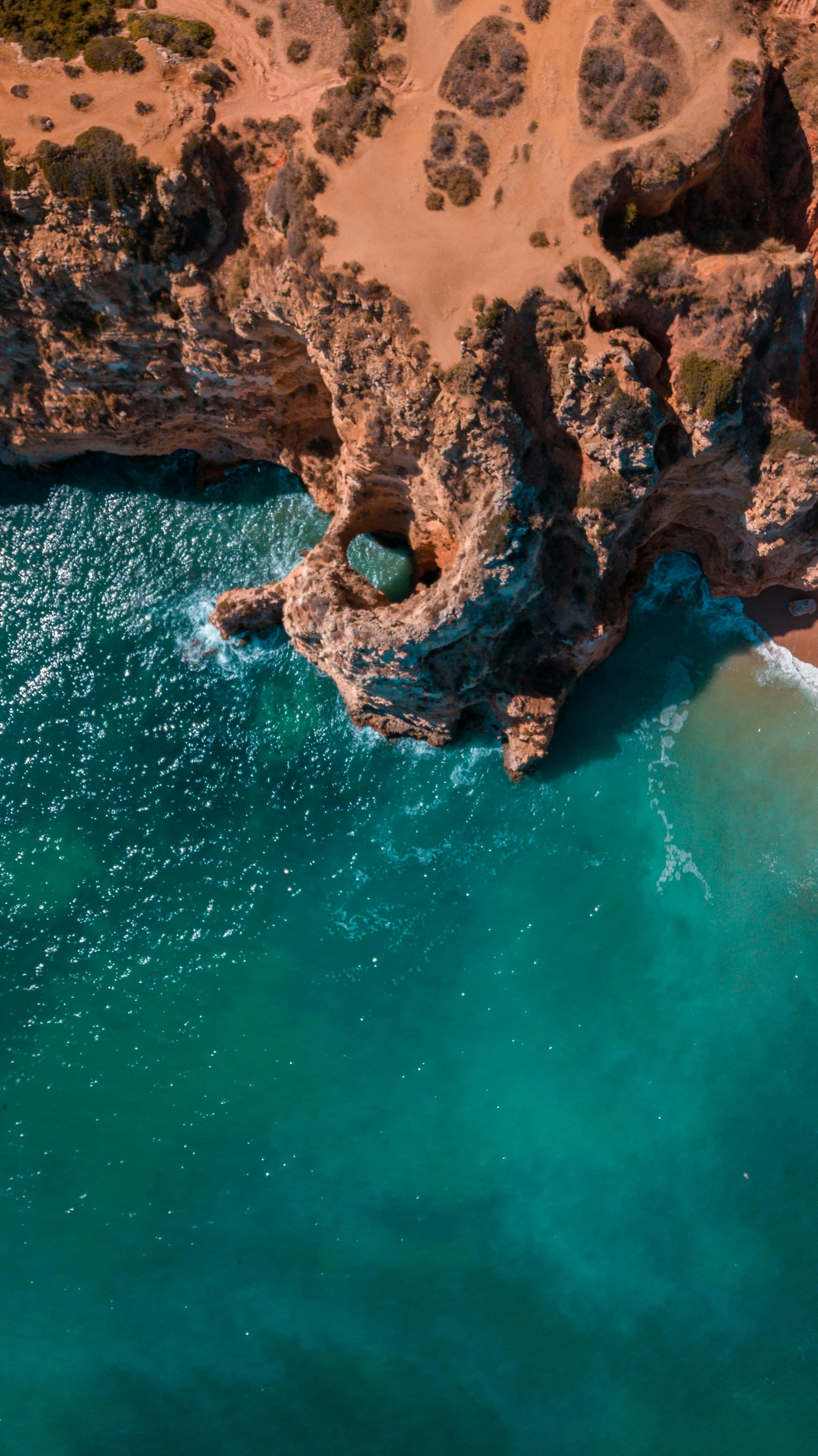 Aerial View of Stunning Coastal Cliff Formation · Free Stock Photo