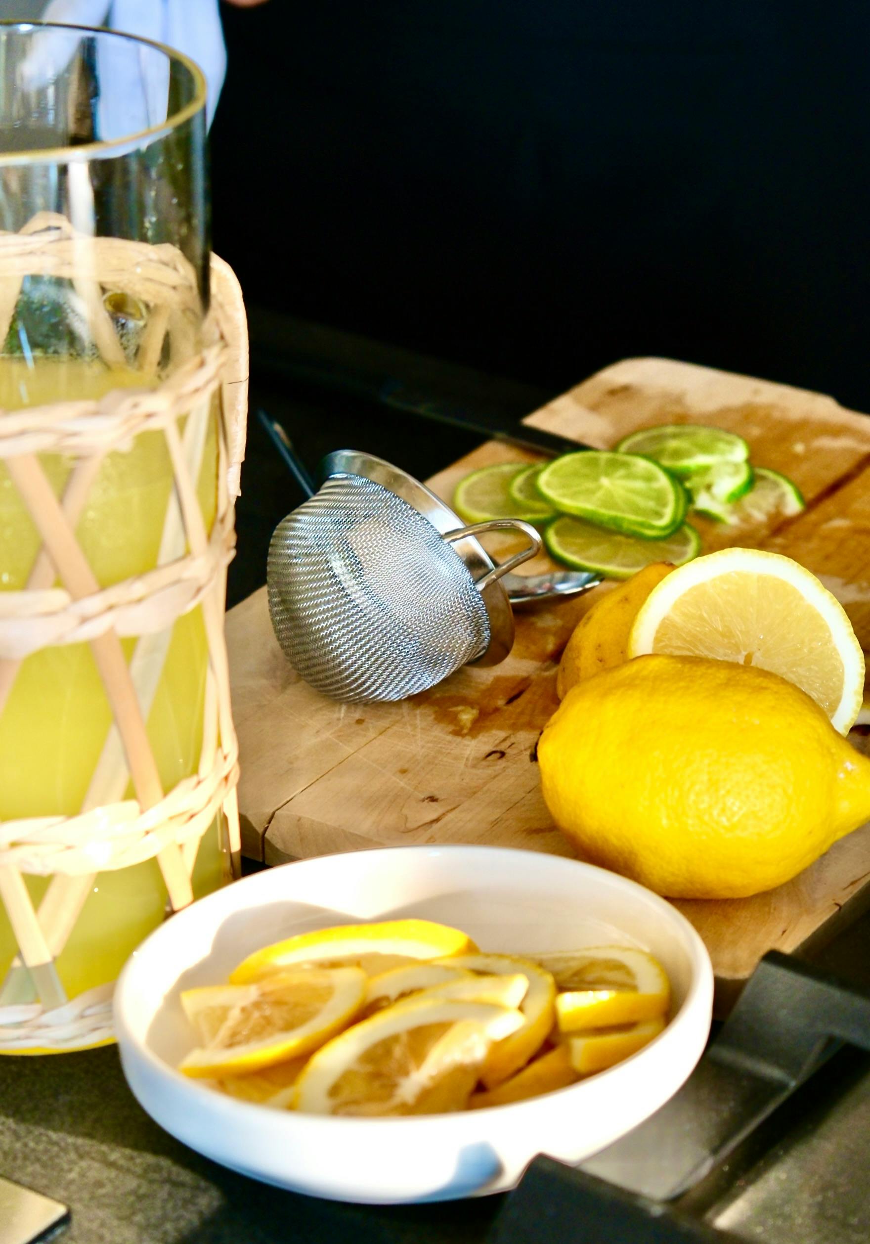 Fresh Lemonade Preparation with Sliced Citrus · Free Stock Photo