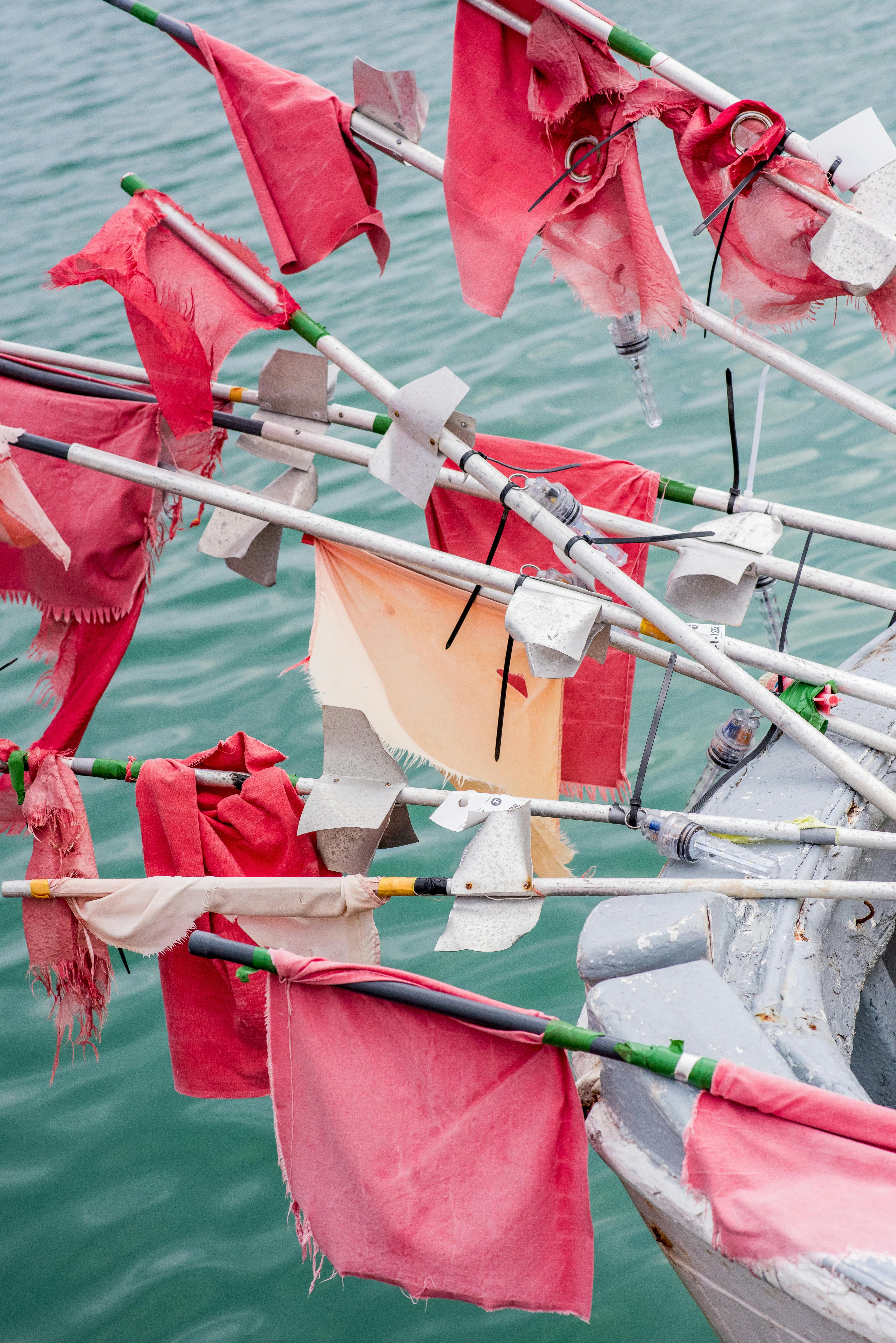 Colorful Nautical Flags on Boat in Harbor · Free Stock Photo
