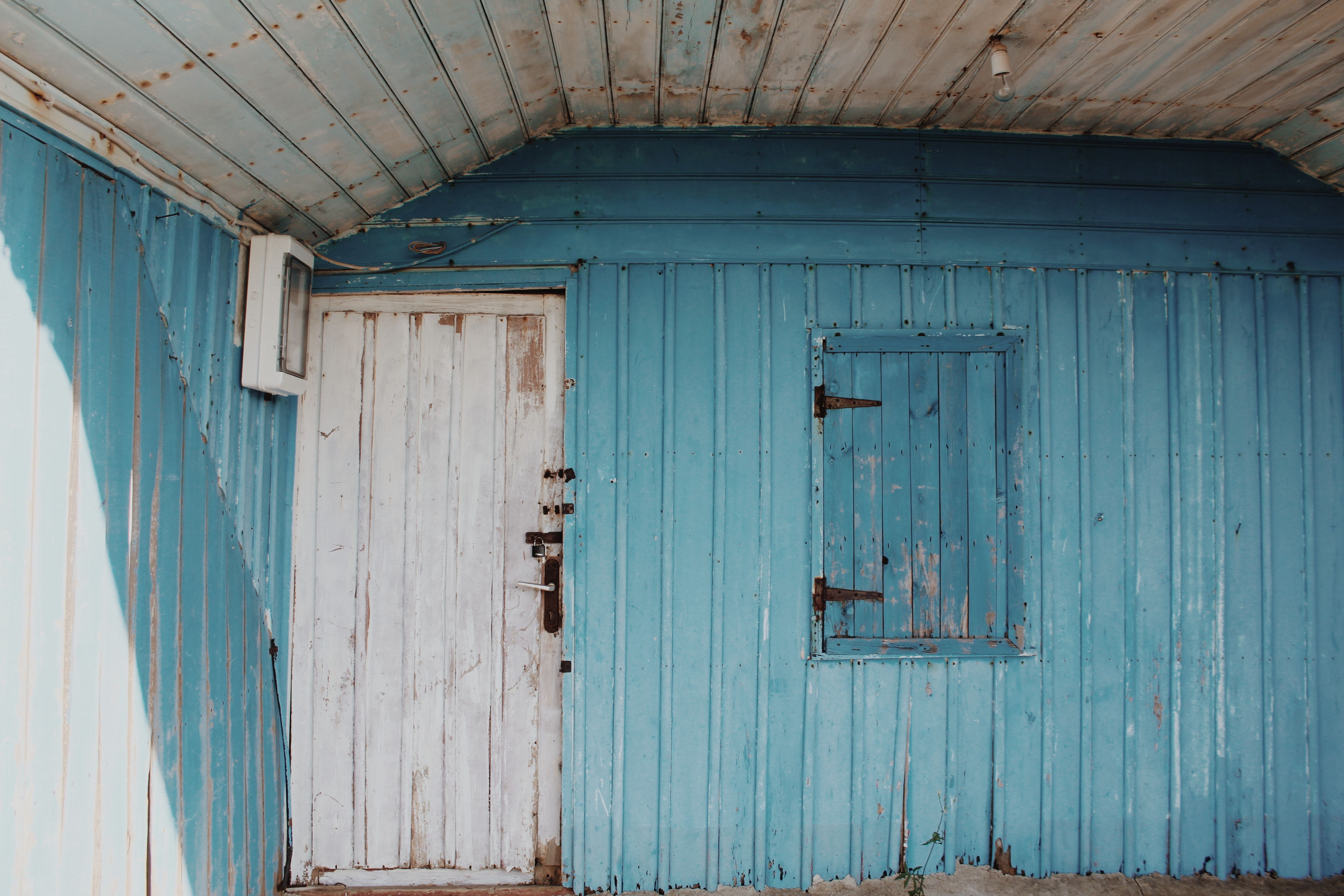 Weathered Blue Wooden Building Exterior · Free Stock Photo
