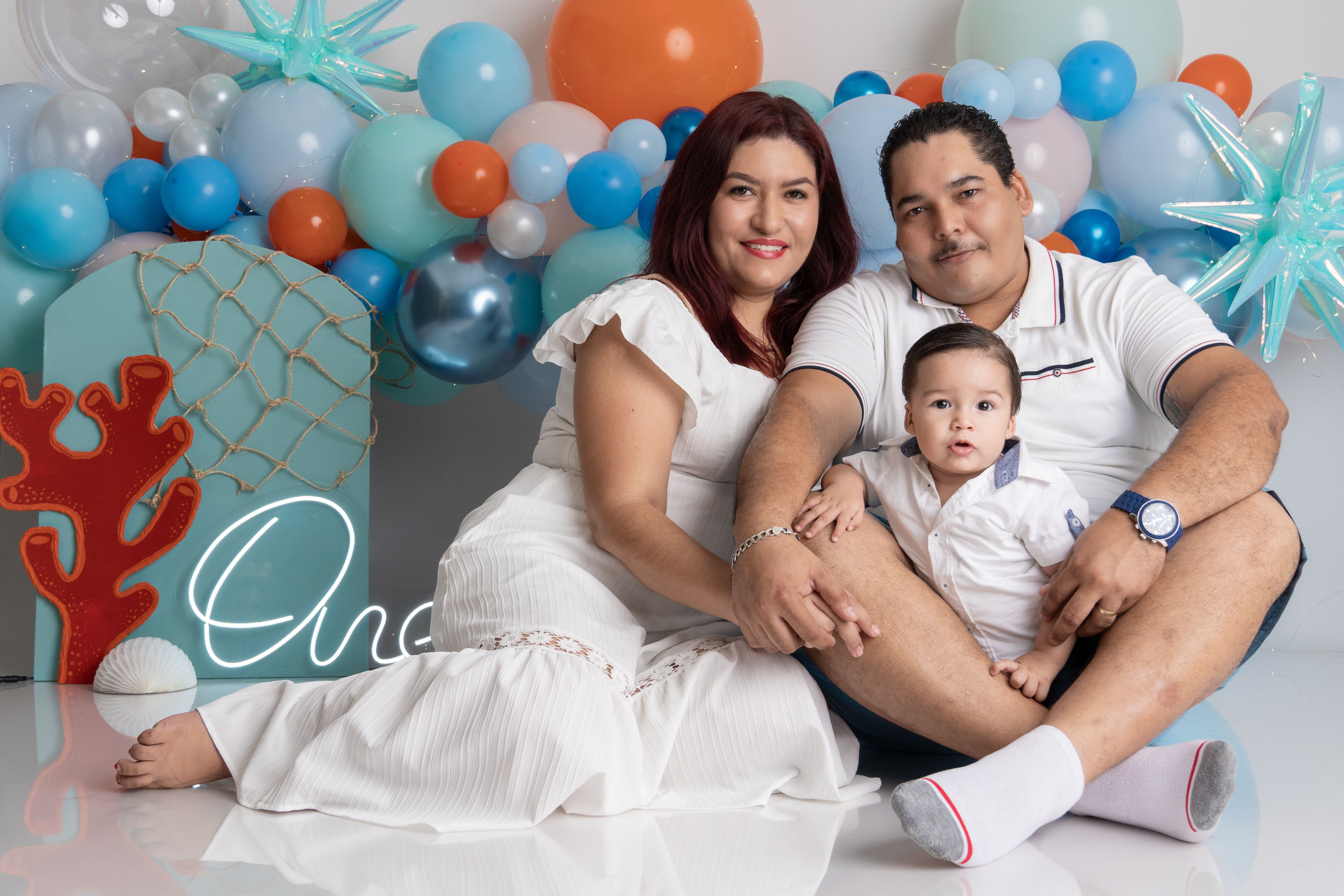 Family Celebration Portrait with Balloon Decor · Free Stock Photo
