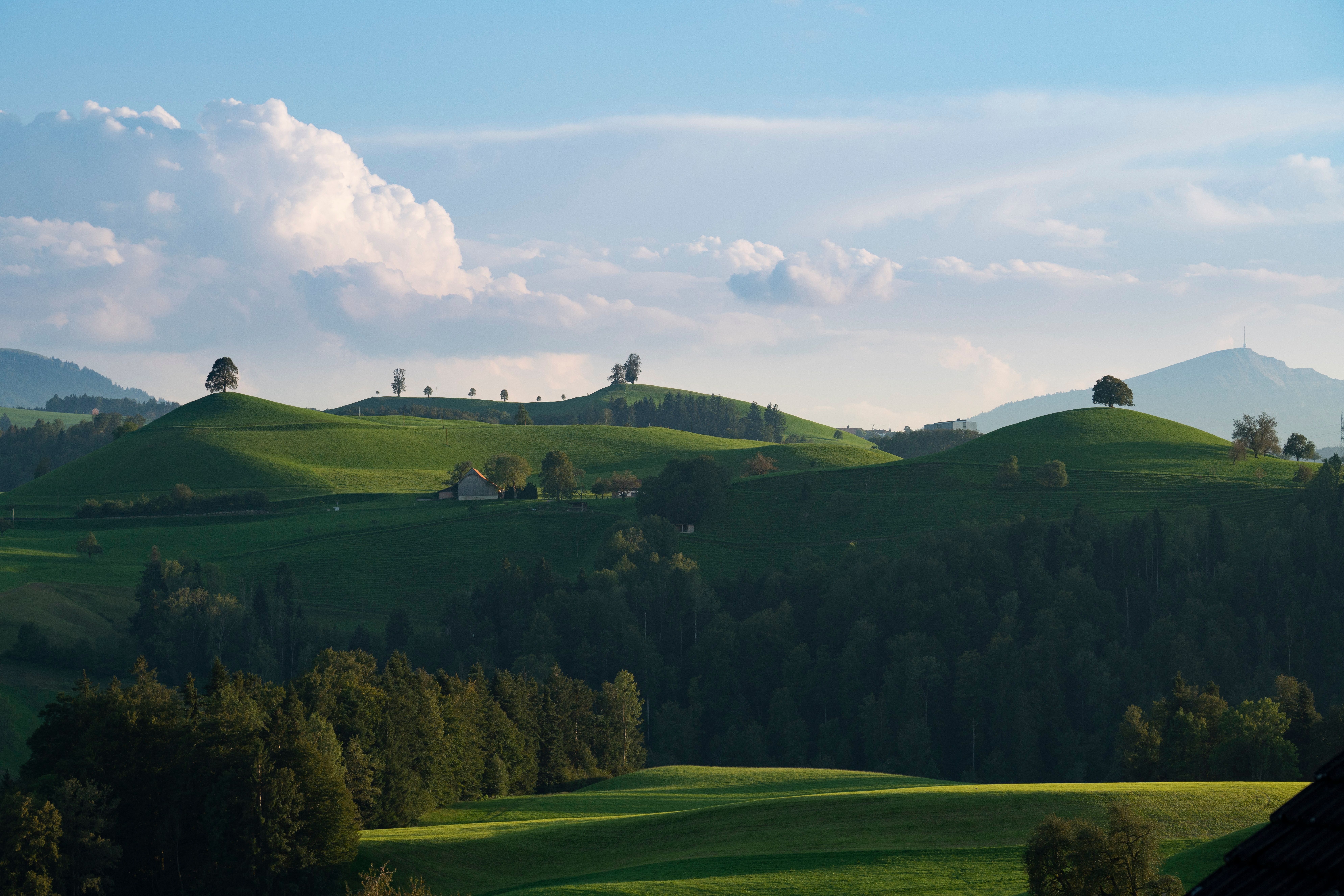 Scenic Green Hills and Sky in Nature Landscape · Free Stock Photo