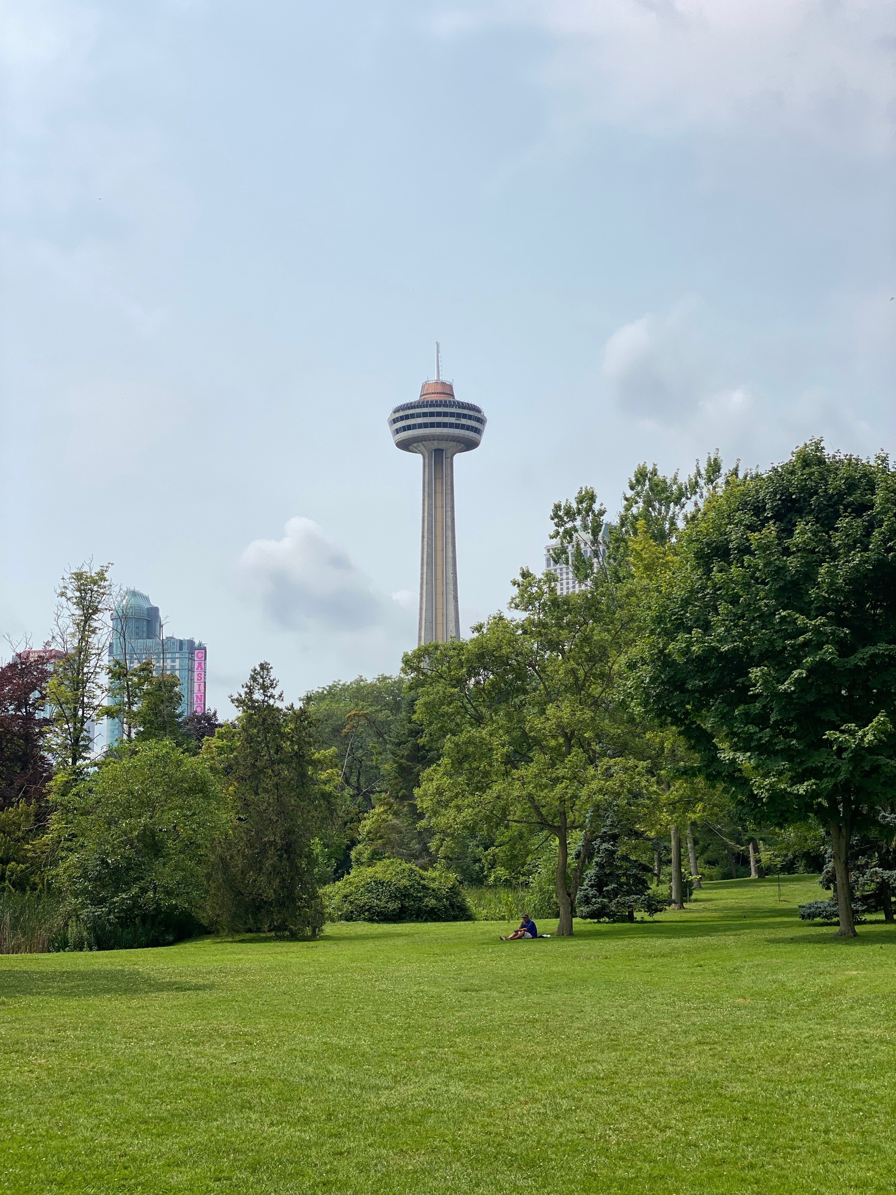 Skylon Tower Overlooking Lush Green Park Landscape · Free Stock Photo