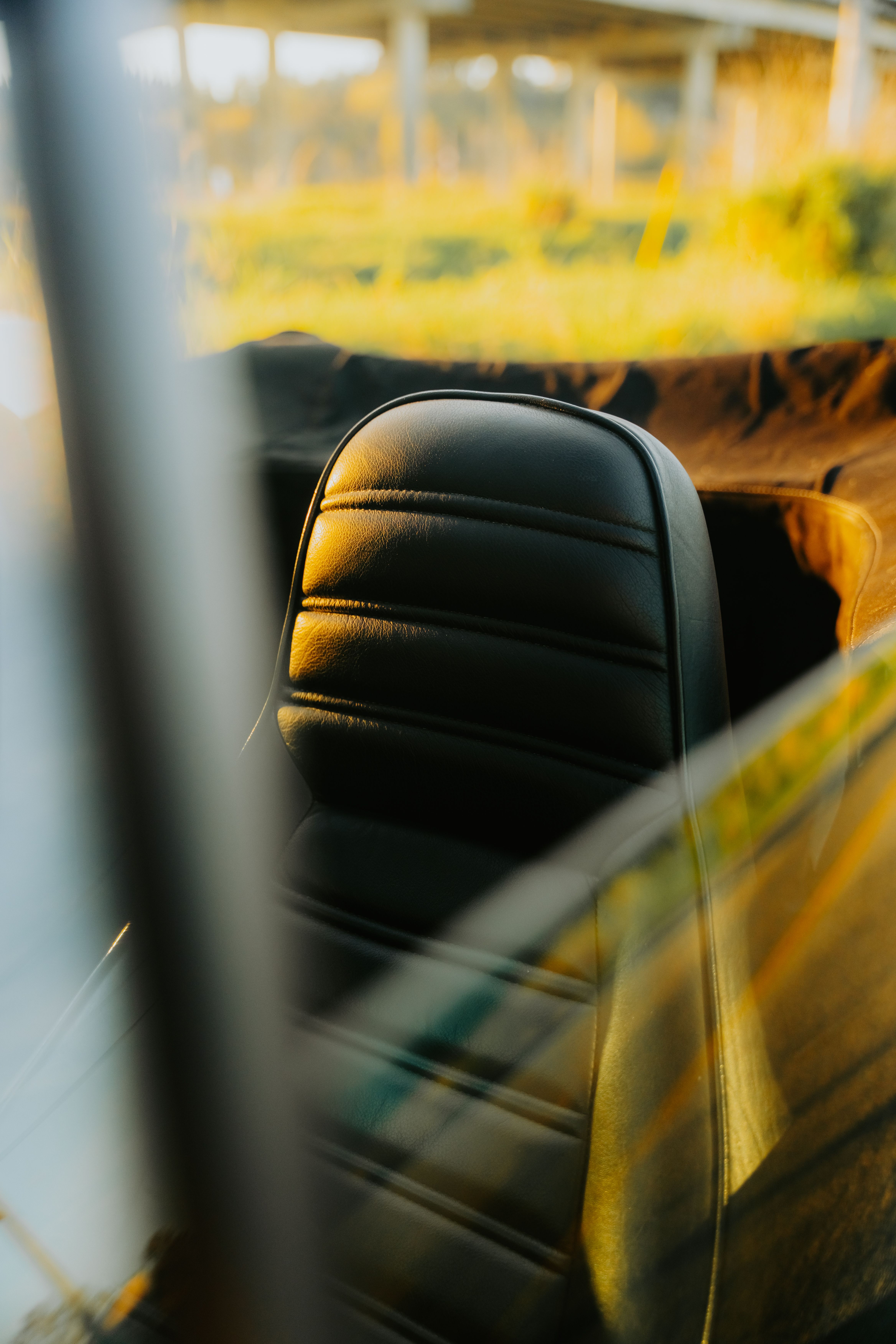 Close-up of Car Seat with Sunlight Reflection · Free Stock Photo