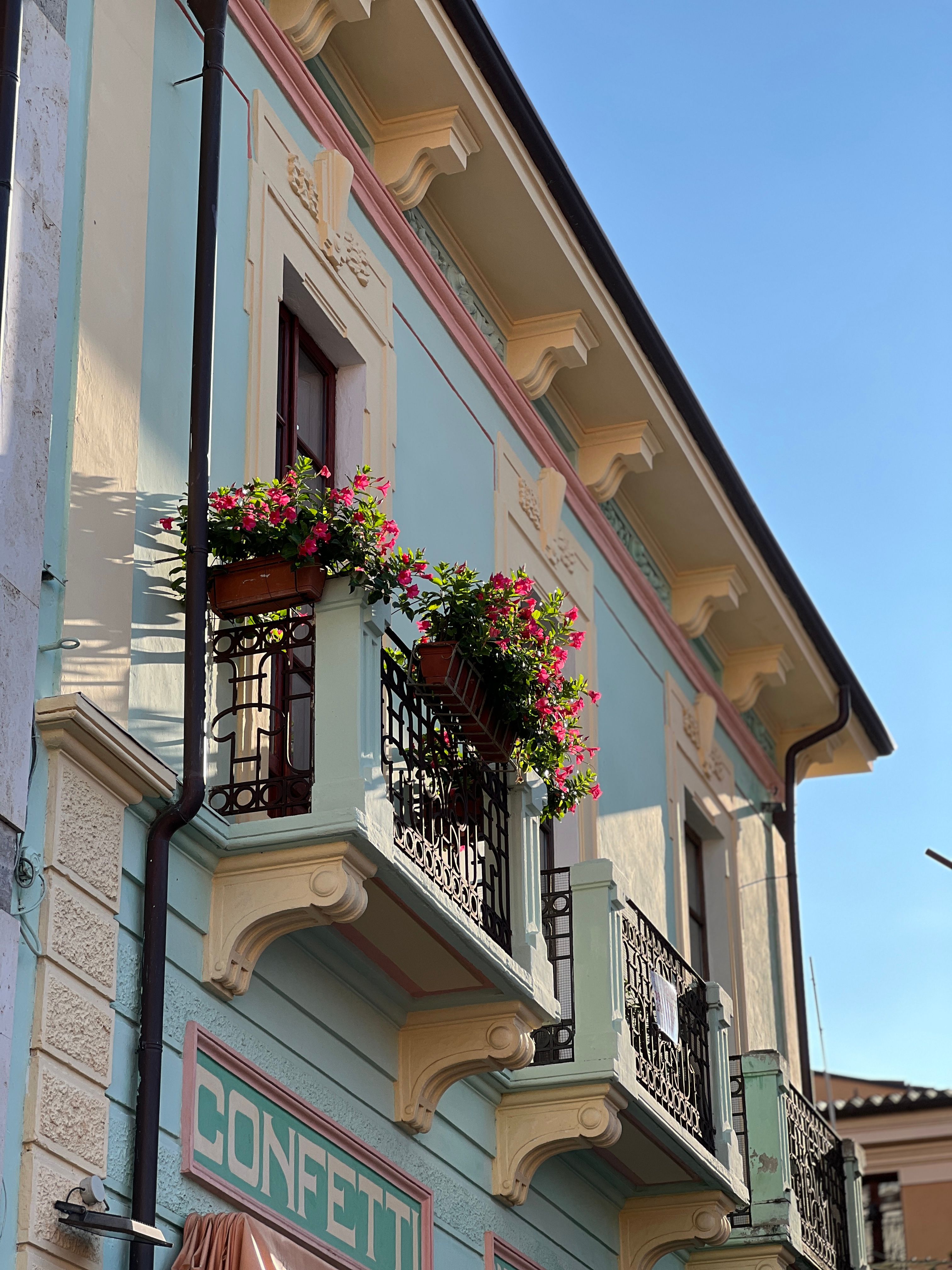 Charming Italian Balcony with Colorful Flowers · Free Stock Photo