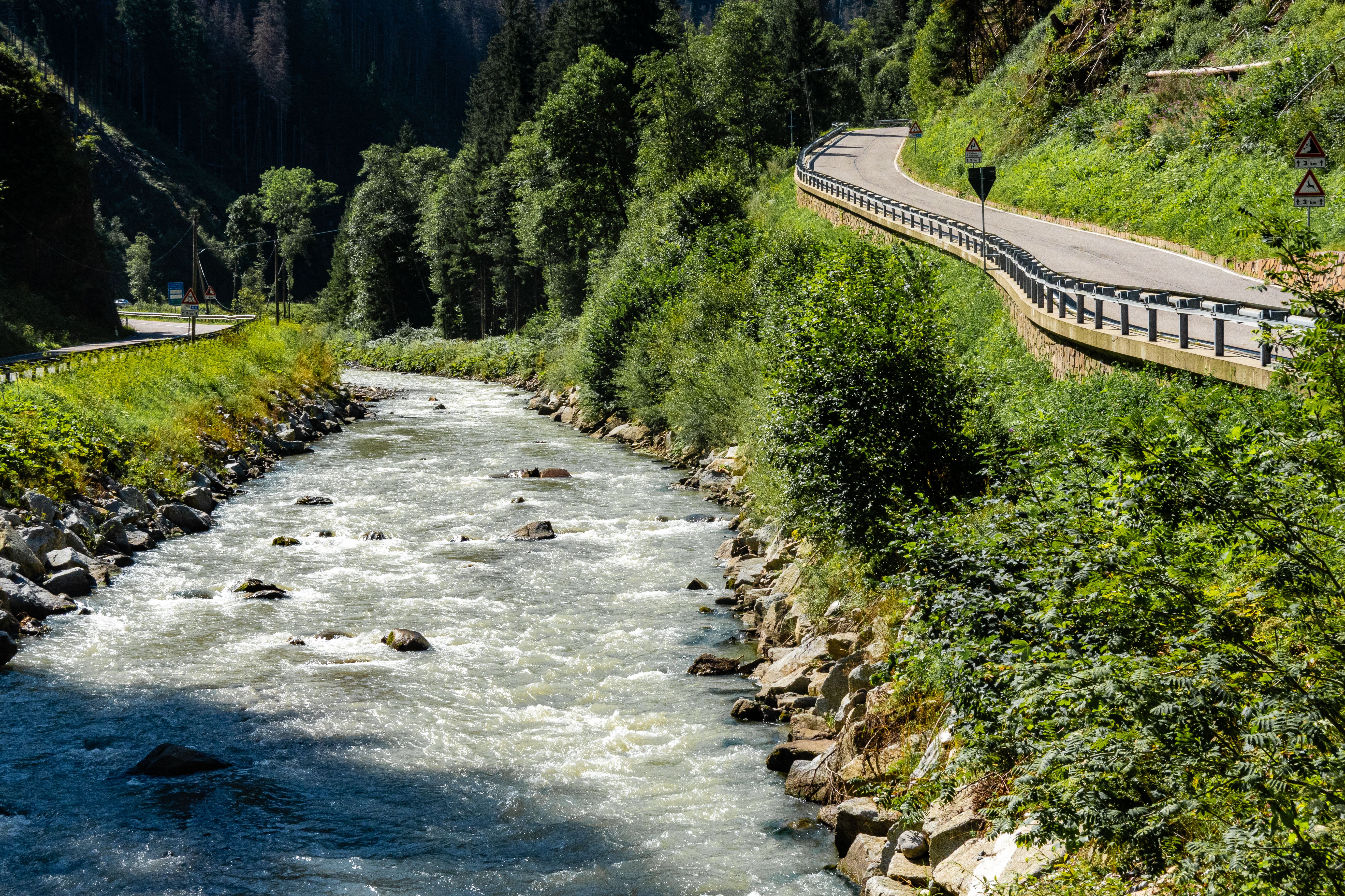 Scenic Mountain River with Winding Road · Free Stock Photo
