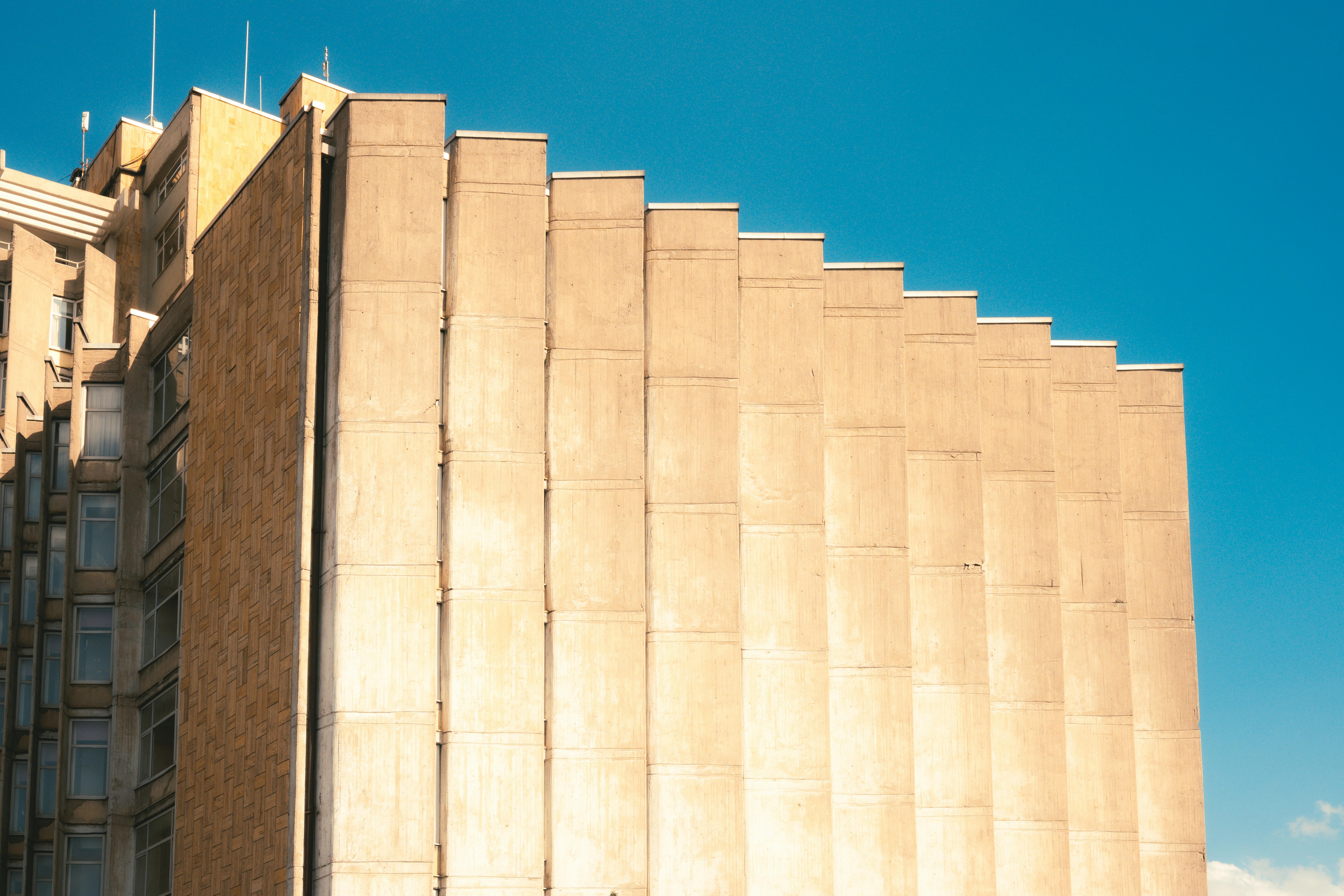 Urban Architecture with Blue Sky Backdrop · Free Stock Photo