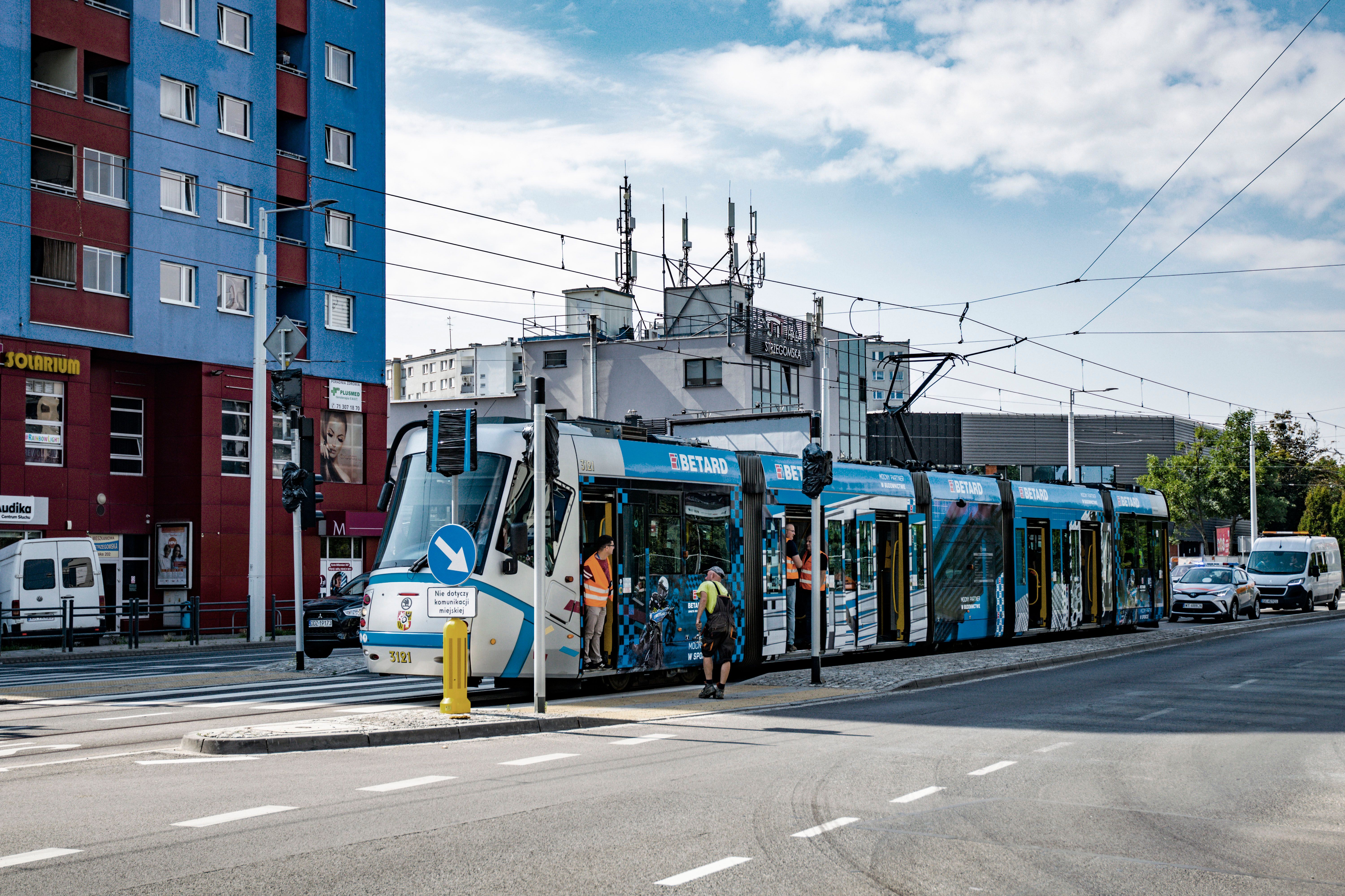 Modern Tram in Urban Wrocław Street · Free Stock Photo