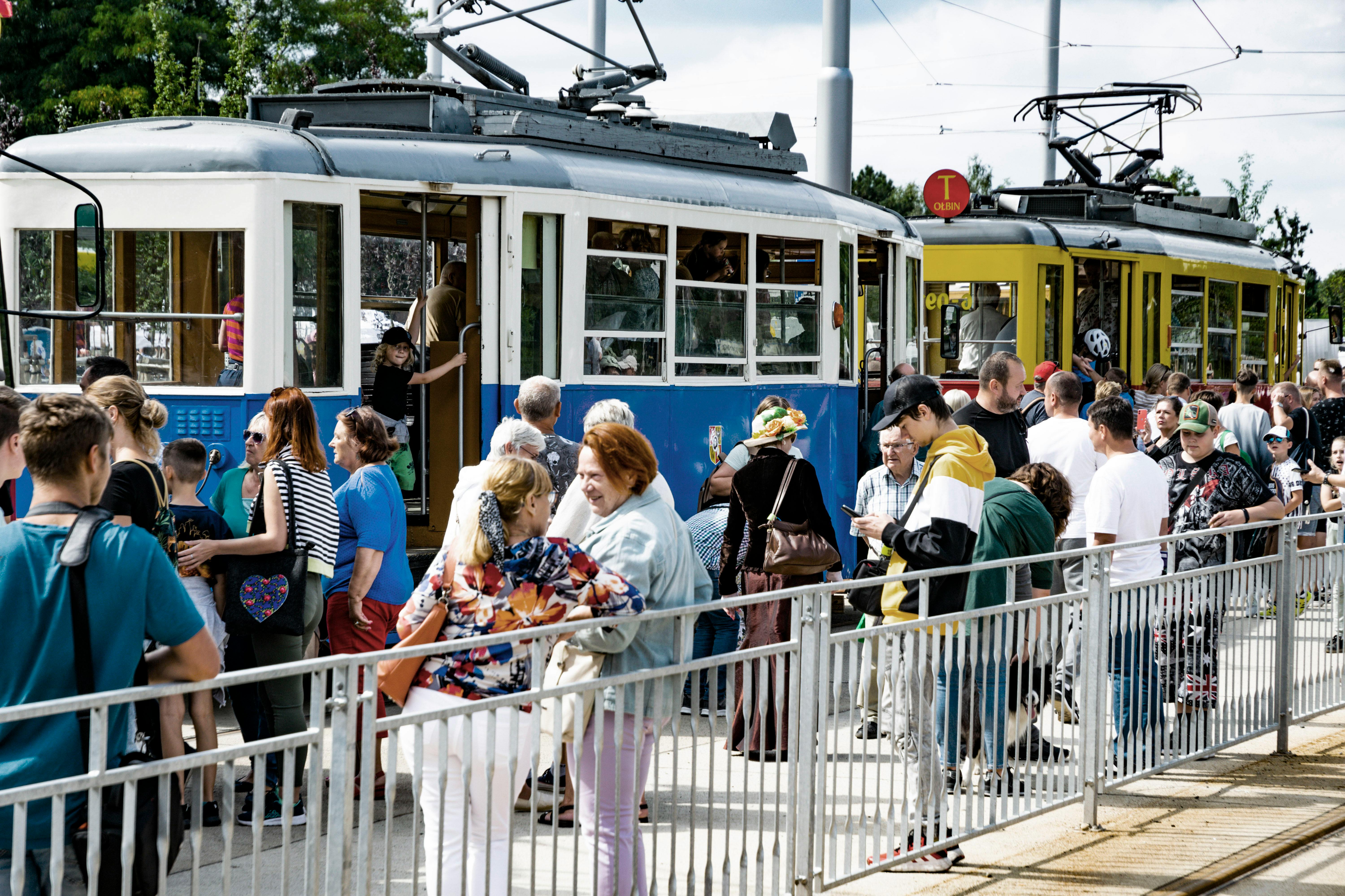 Crowd Boarding Trams at Wrocław Station · Free Stock Photo